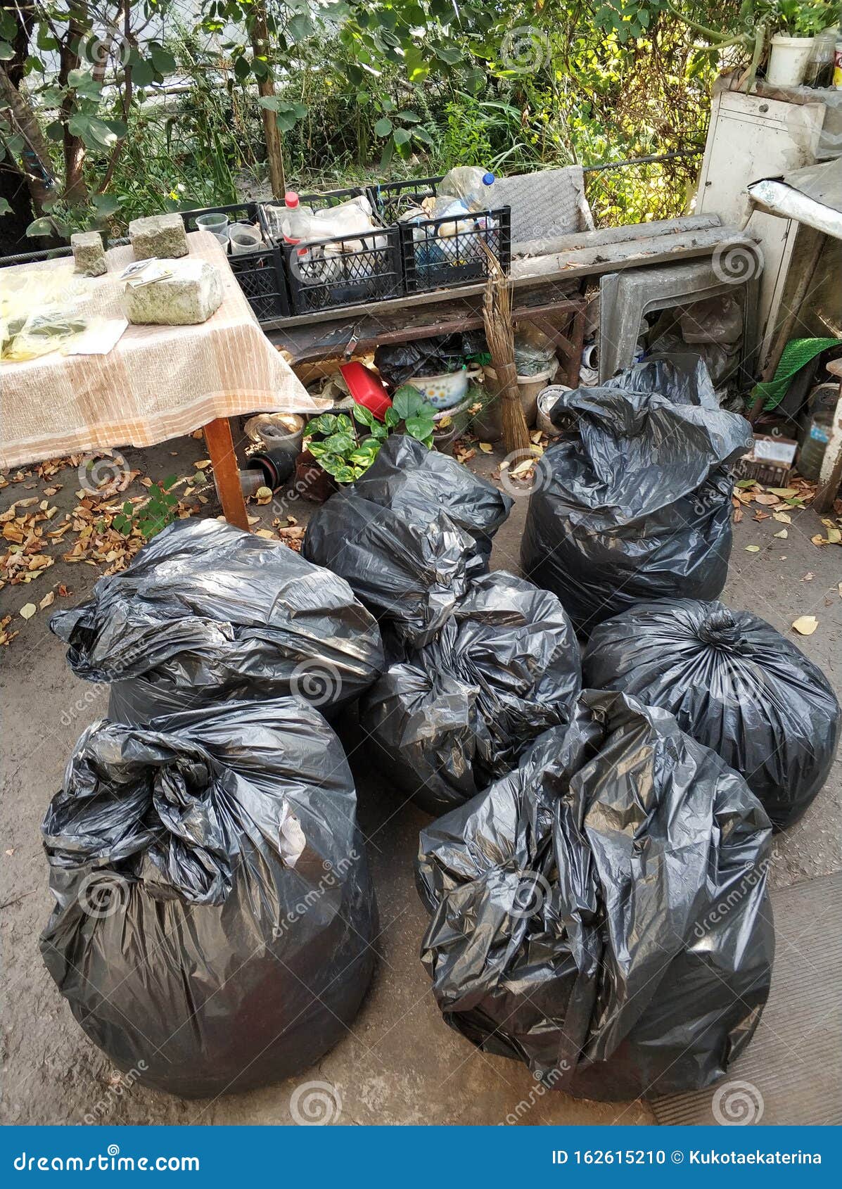 Black Bags with Trash on the Street in the Yard Stock Photo - Image of ...