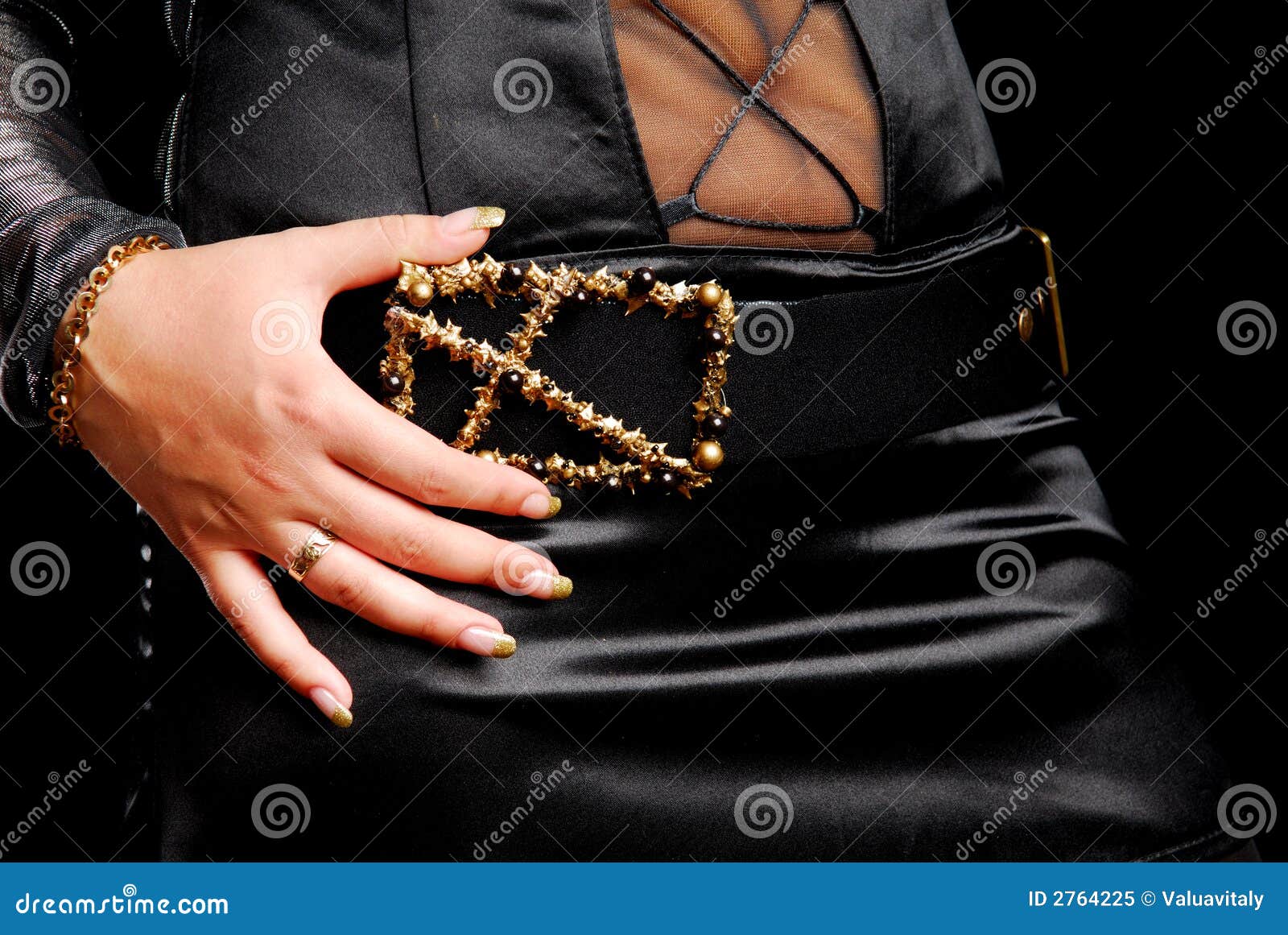 Black Belt with Gold Pendant Stock Image - Image of indoor, hand: 2764225