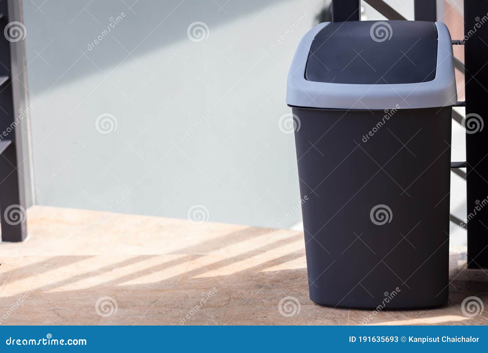 A Black Bin at Home. Black Trash Can. Garbage Trash Bin. Stock Image ...