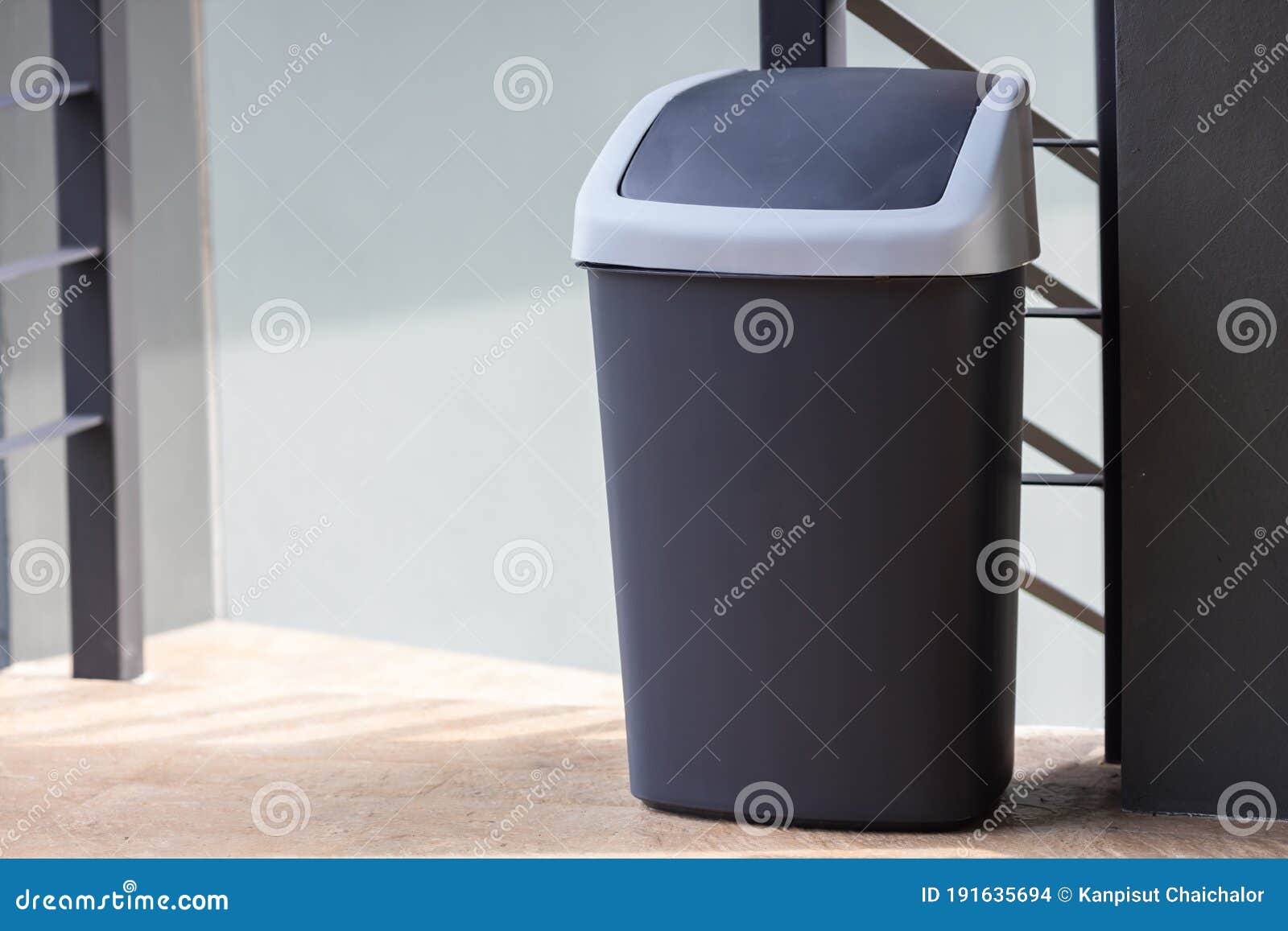 A Black Bin at Home. Black Trash Can. Garbage Trash Bin. Stock Photo ...