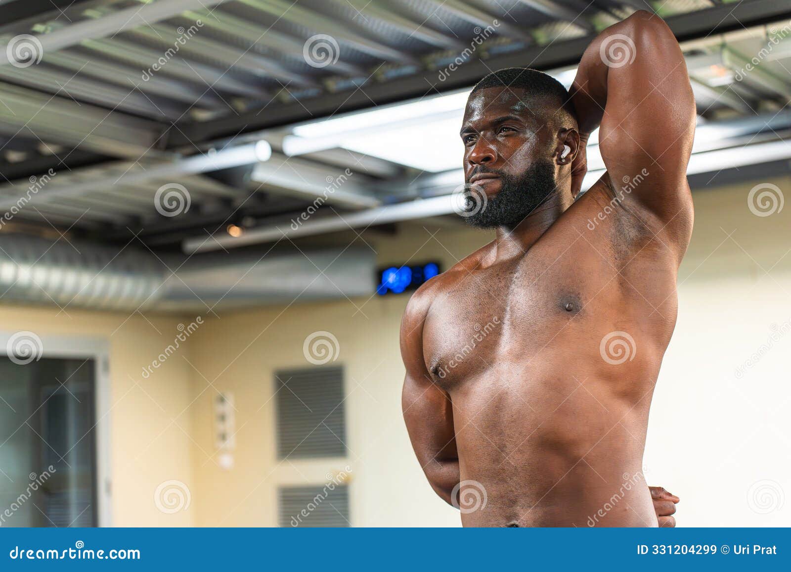 Black Bodybuilder Stretching His Muscles before Strength Training Stock ...