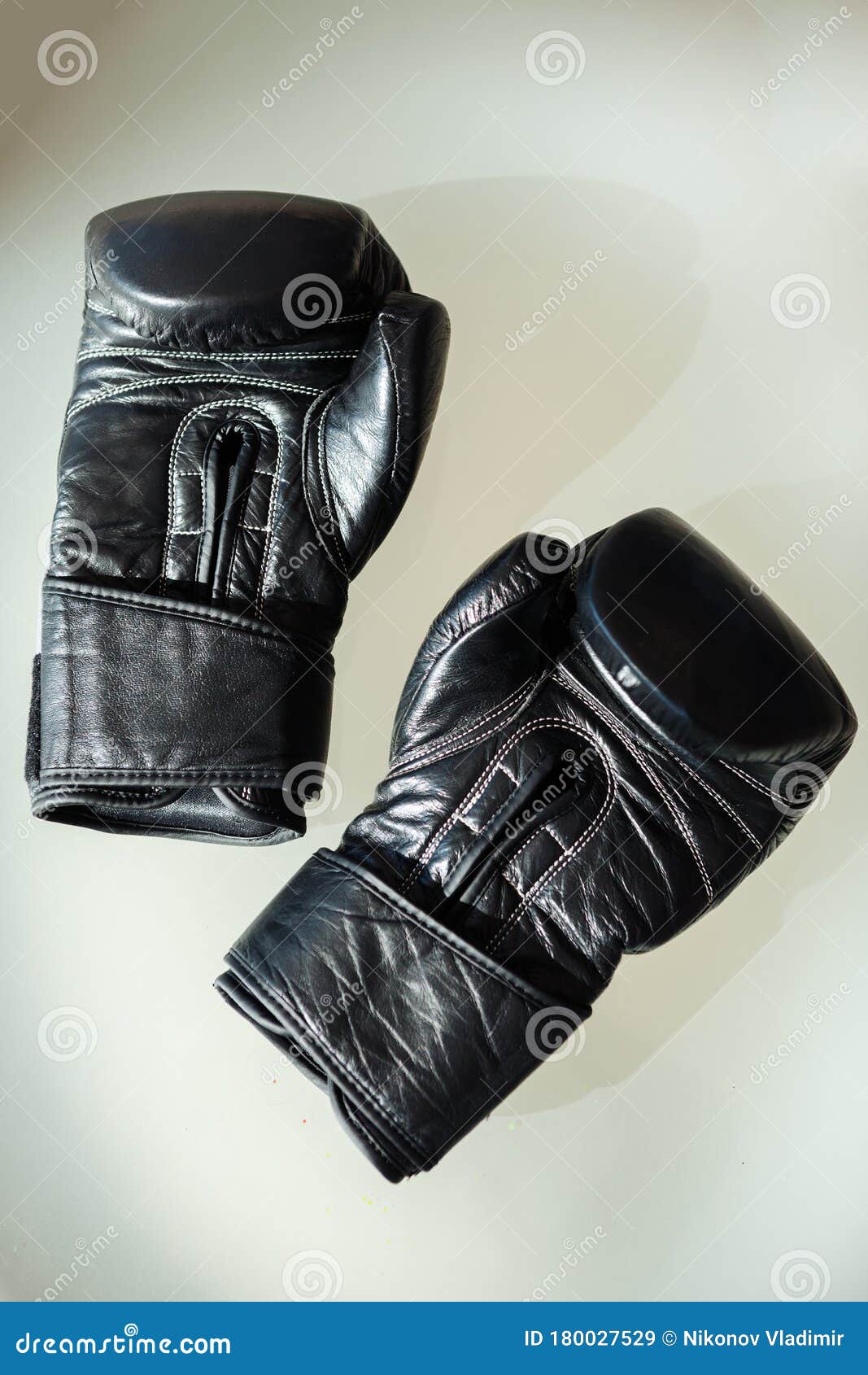 Black Boxing Gloves Lie on a White Table. Stock Image - Image of knock ...