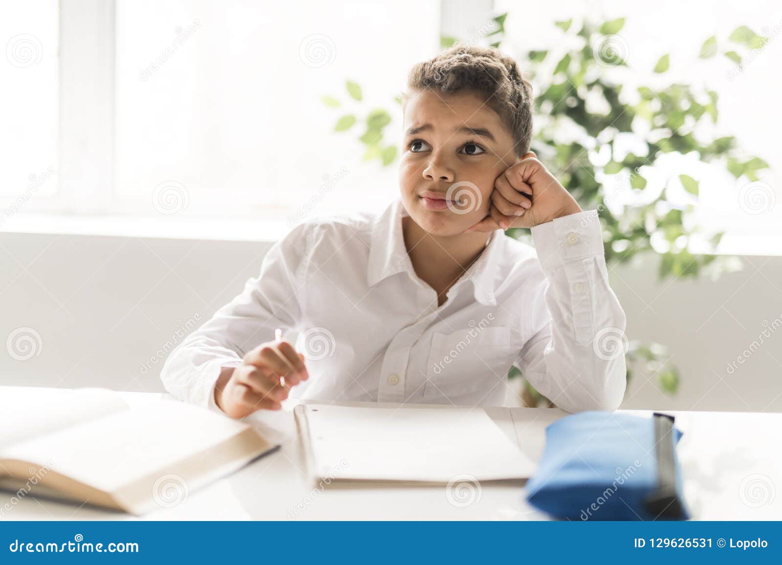 A Cute Black Boy Doing Homework at Home Stock Image - Image of desk ...
