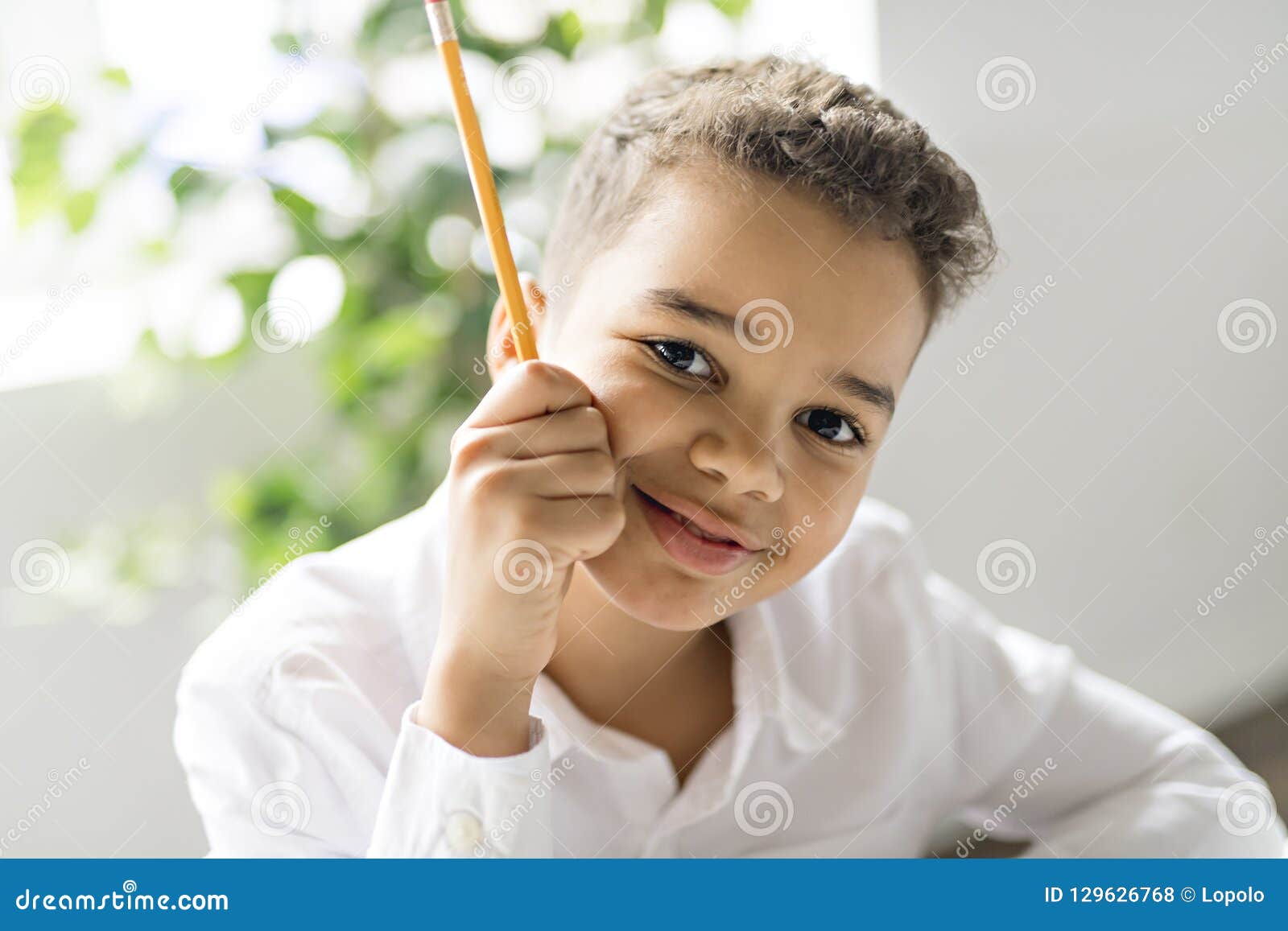 A Cute Black Boy Doing Homework at Home Stock Photo - Image of portrait ...