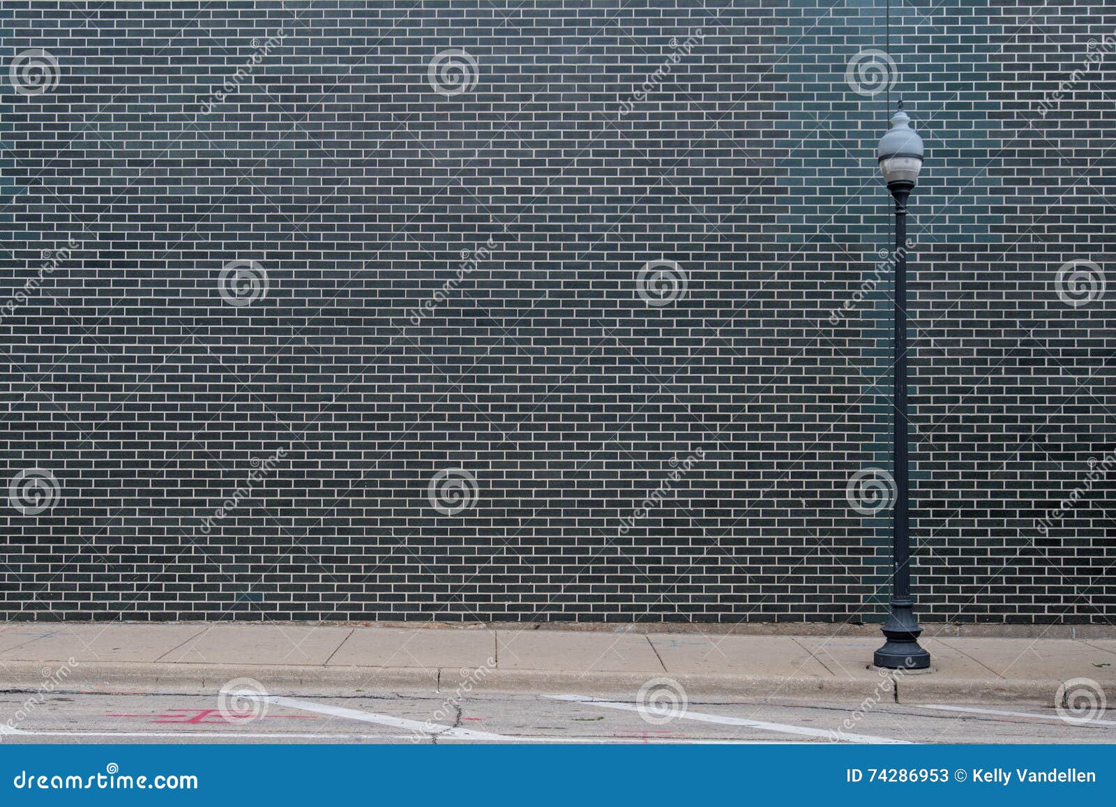 Black Brick Wall with Light Post Stock Image - Image of light, urban ...