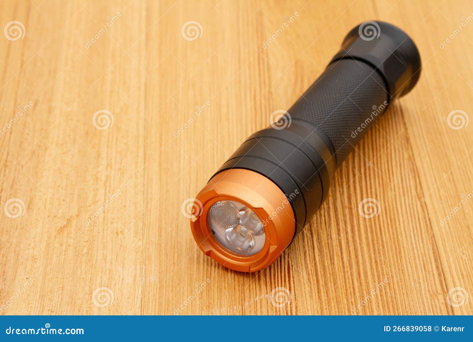 LED Flashlight on Wood Table Stock Photo - Image of electricity, lamp ...
