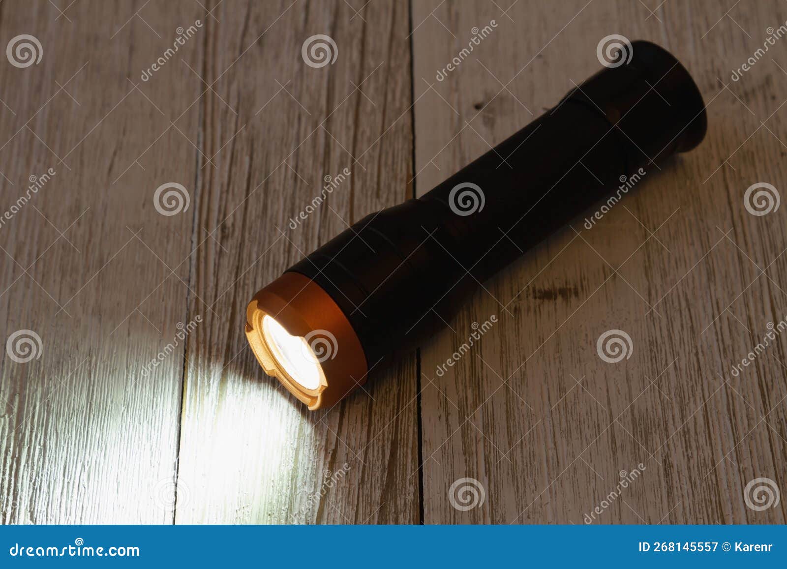 LED Flashlight on Wood Table Stock Image - Image of flashlight ...