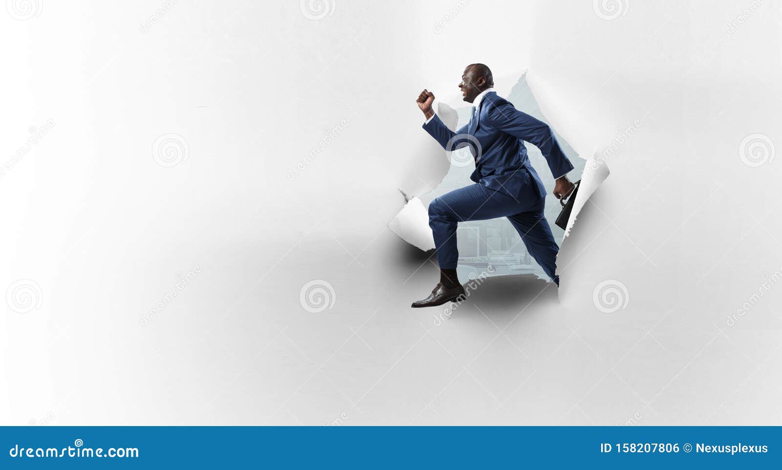 Breakthrough Paper Hole with a Black Businessman Stock Photo - Image of ...