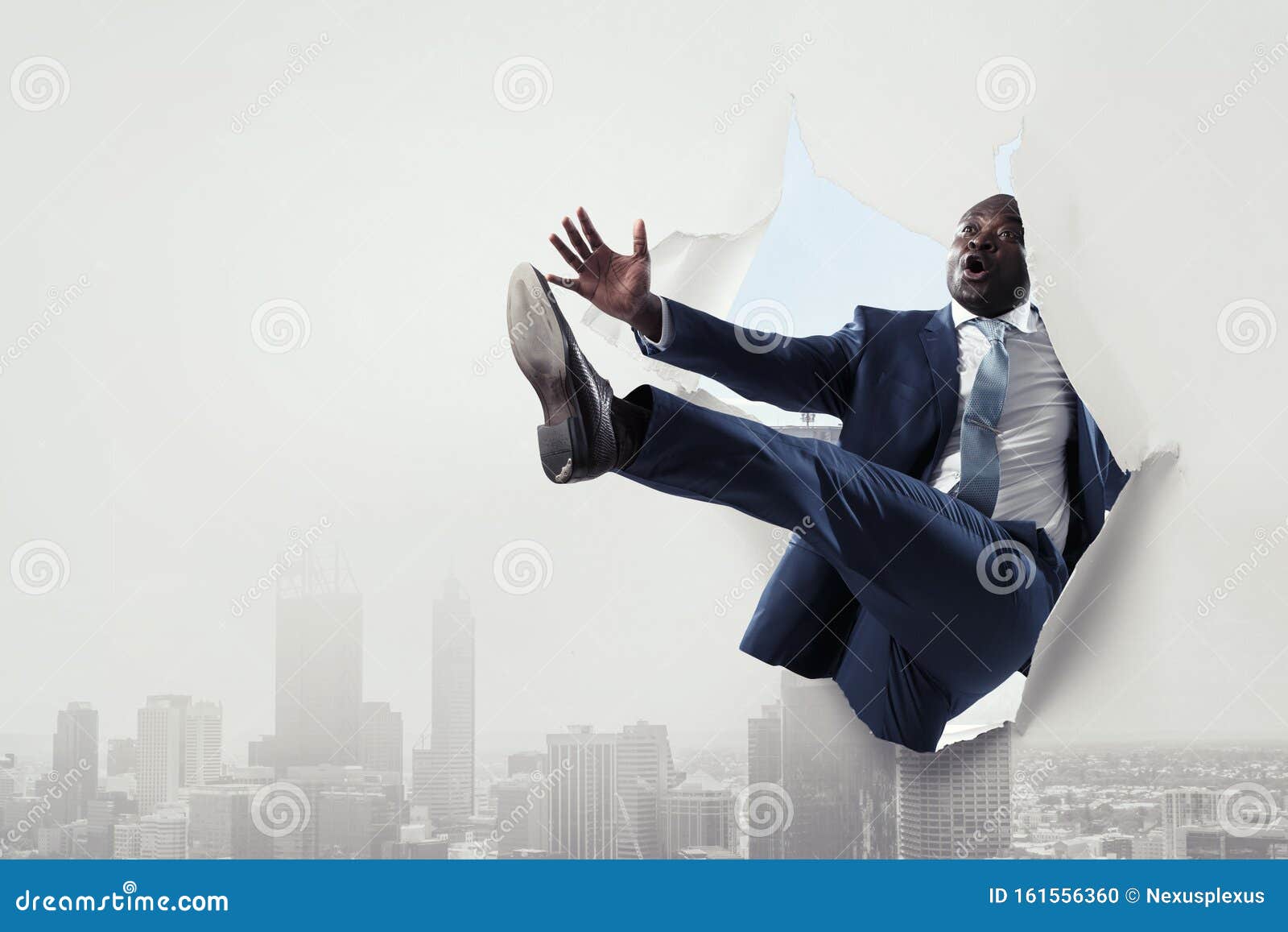 Breakthrough Paper Hole with a Black Businessman Stock Photo - Image of ...