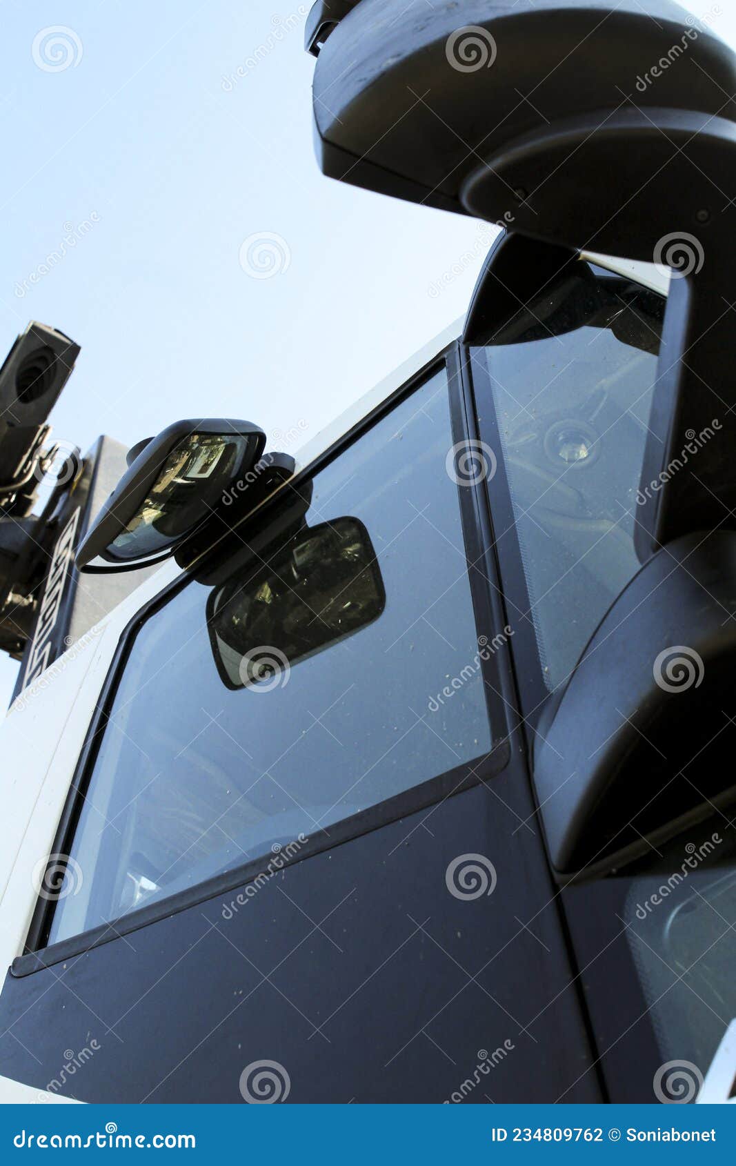 Cabin of a Truck Crane with Rear-view Mirror Stock Photo - Image of ...