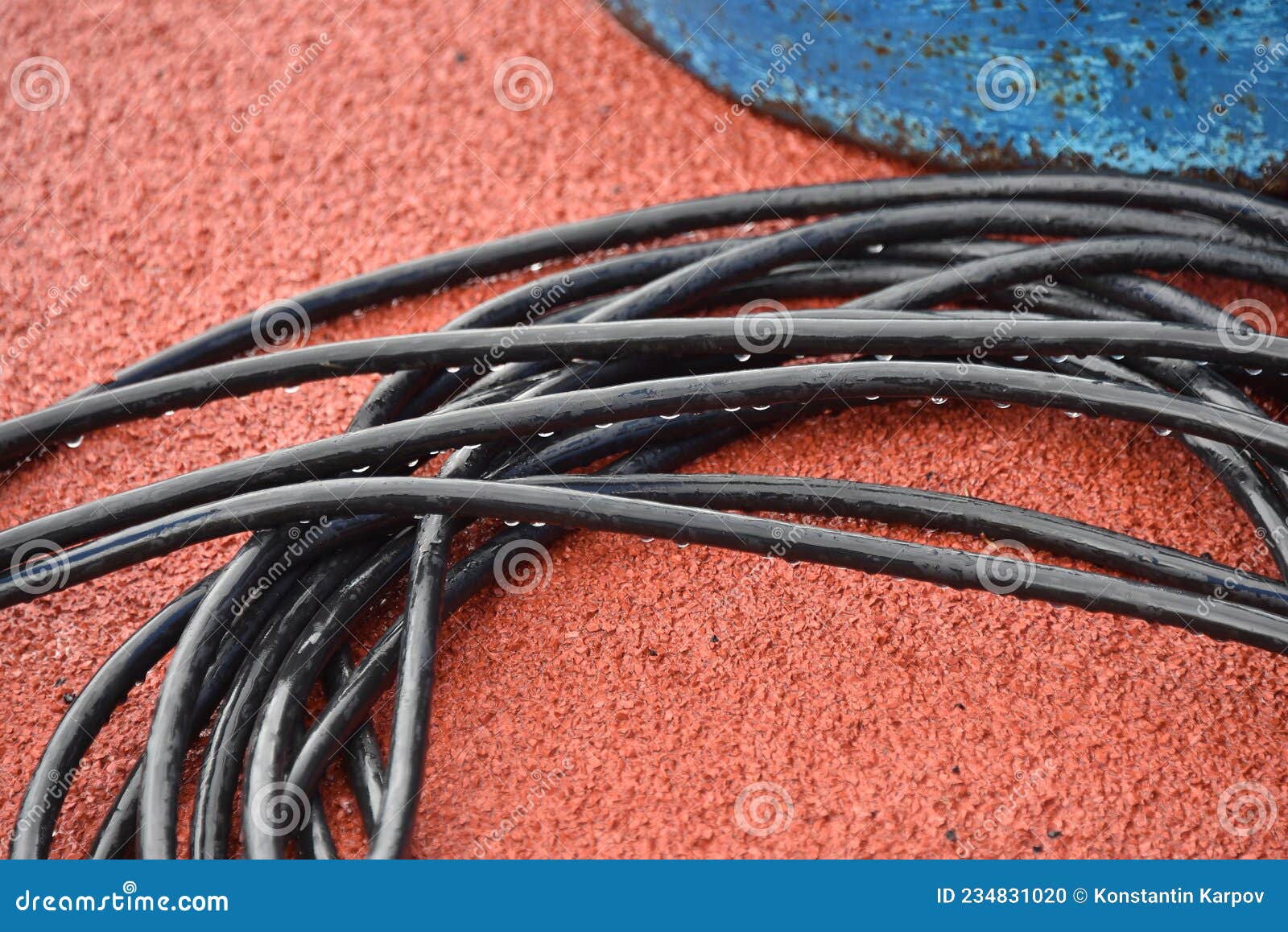 Black Cable Wire with Rain Drops on the Street Stock Photo - Image of ...