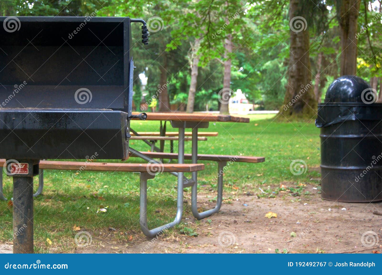 A Campground BBQ Grill and Garbage Can Stock Image - Image of grill ...