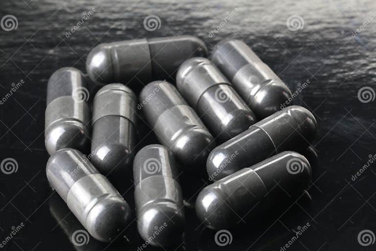 Black capsules stock image. Image of attention, doctor - 86402913