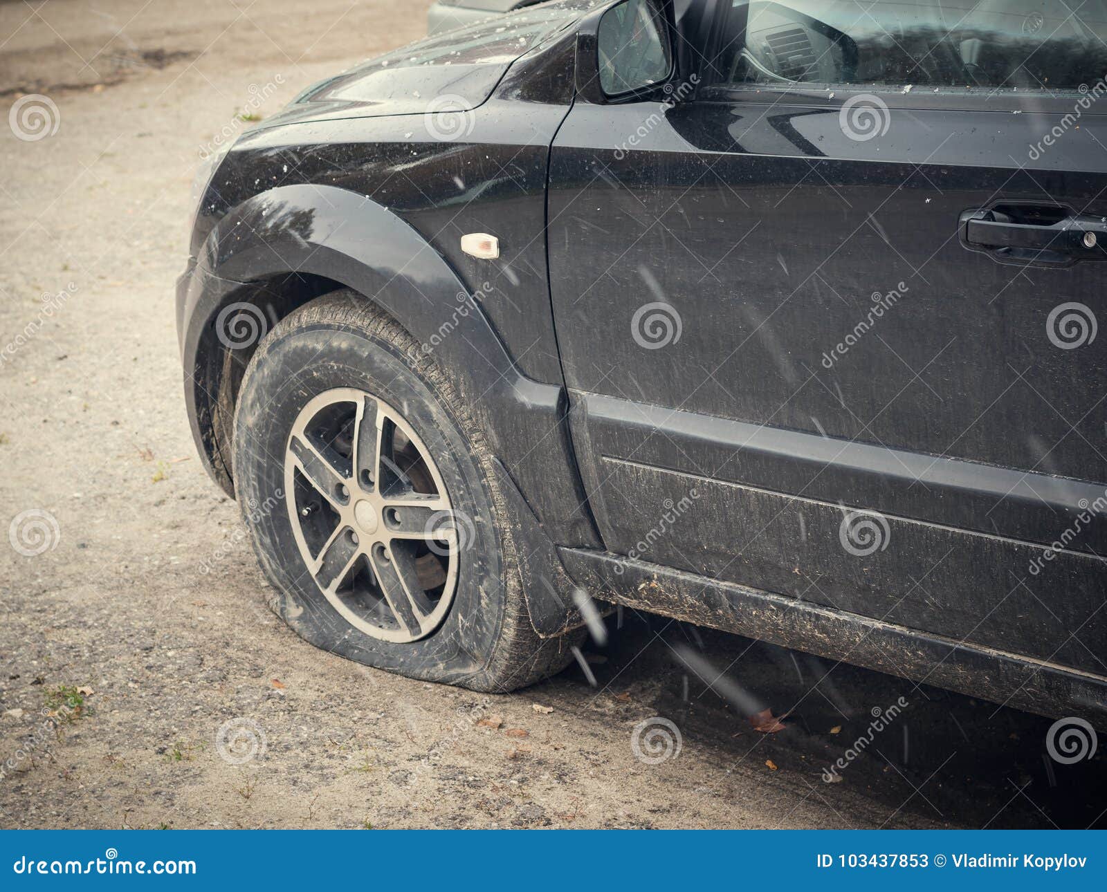 Black Car with Punctured Wheel Under the Open Sky. Stock Image - Image ...