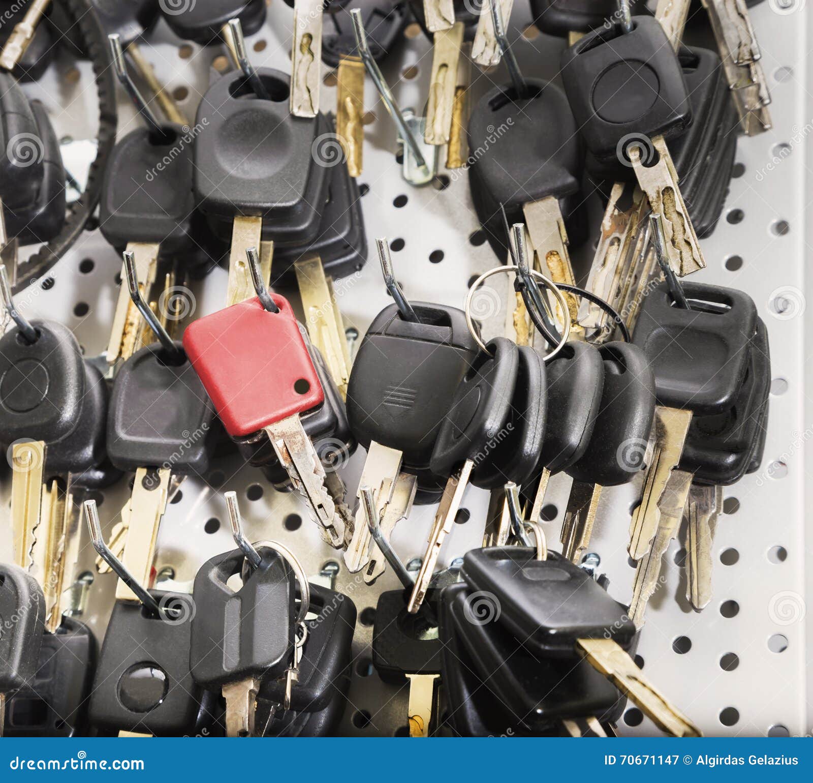 Black Car Keys and a Red One on a Special Wall Stock Image - Image of ...