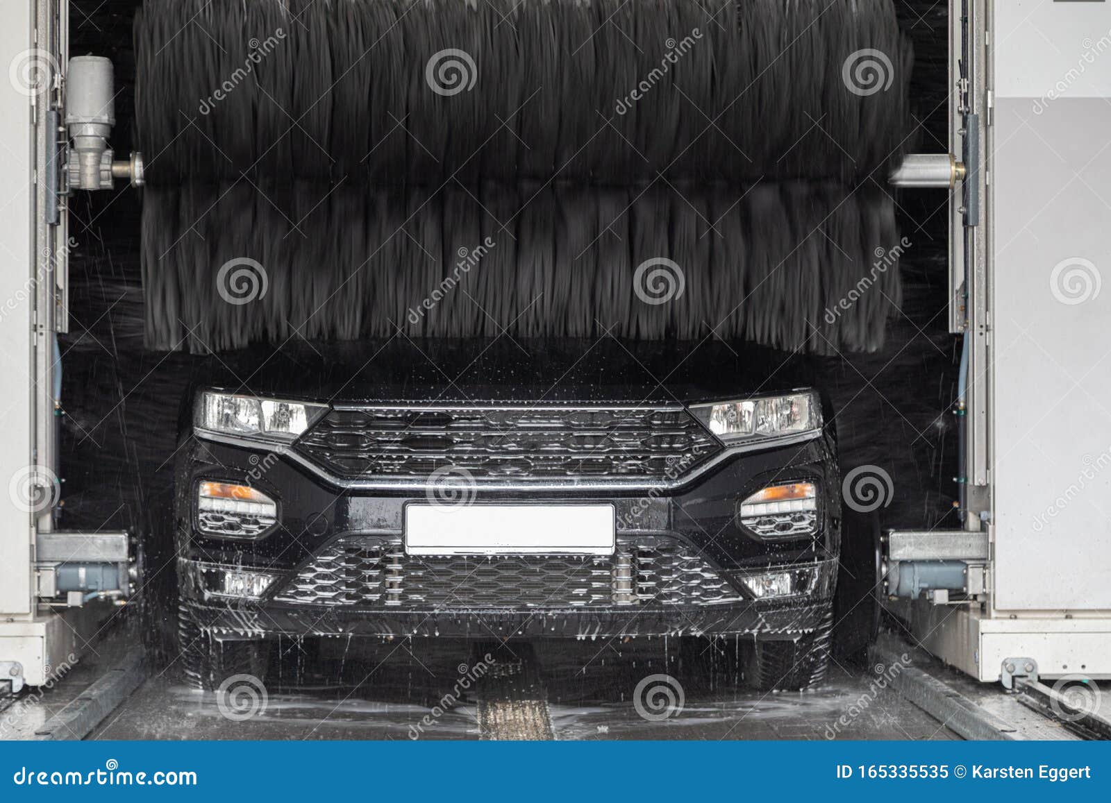 Black Car Stands in a Car Wash and is Washed Stock Image - Image of ...