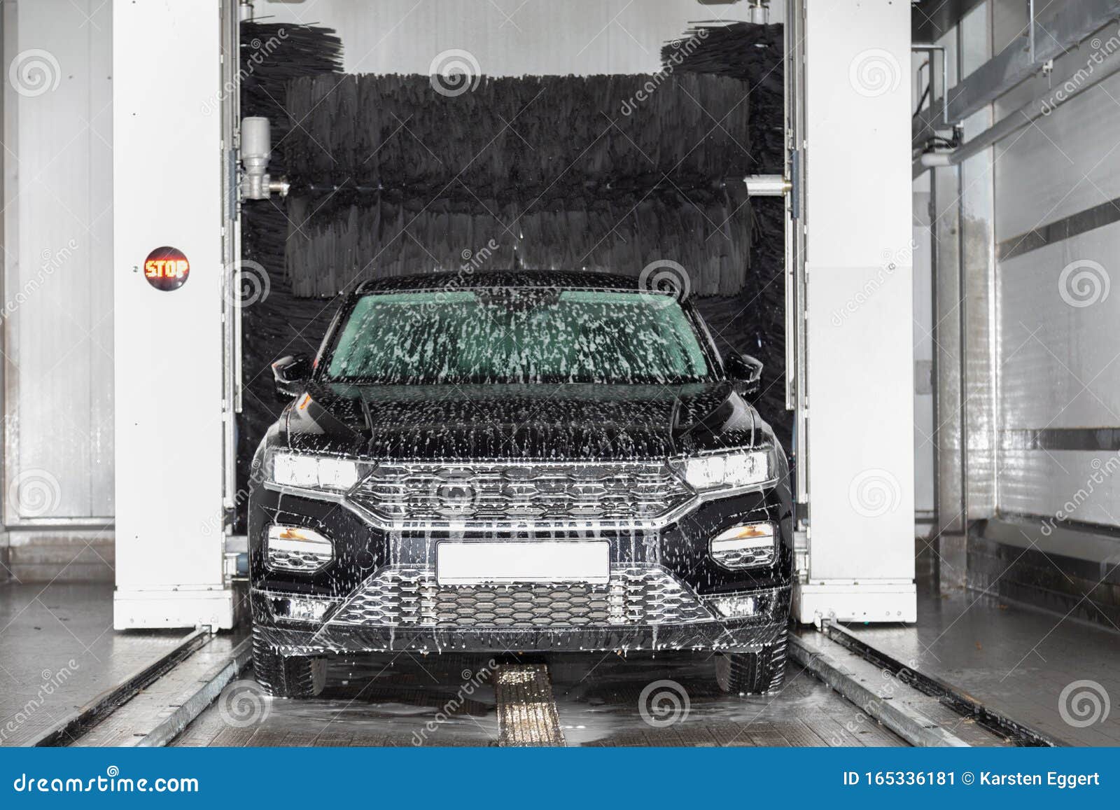 Black Car Stands in a Car Wash and is Washed Stock Image - Image of ...