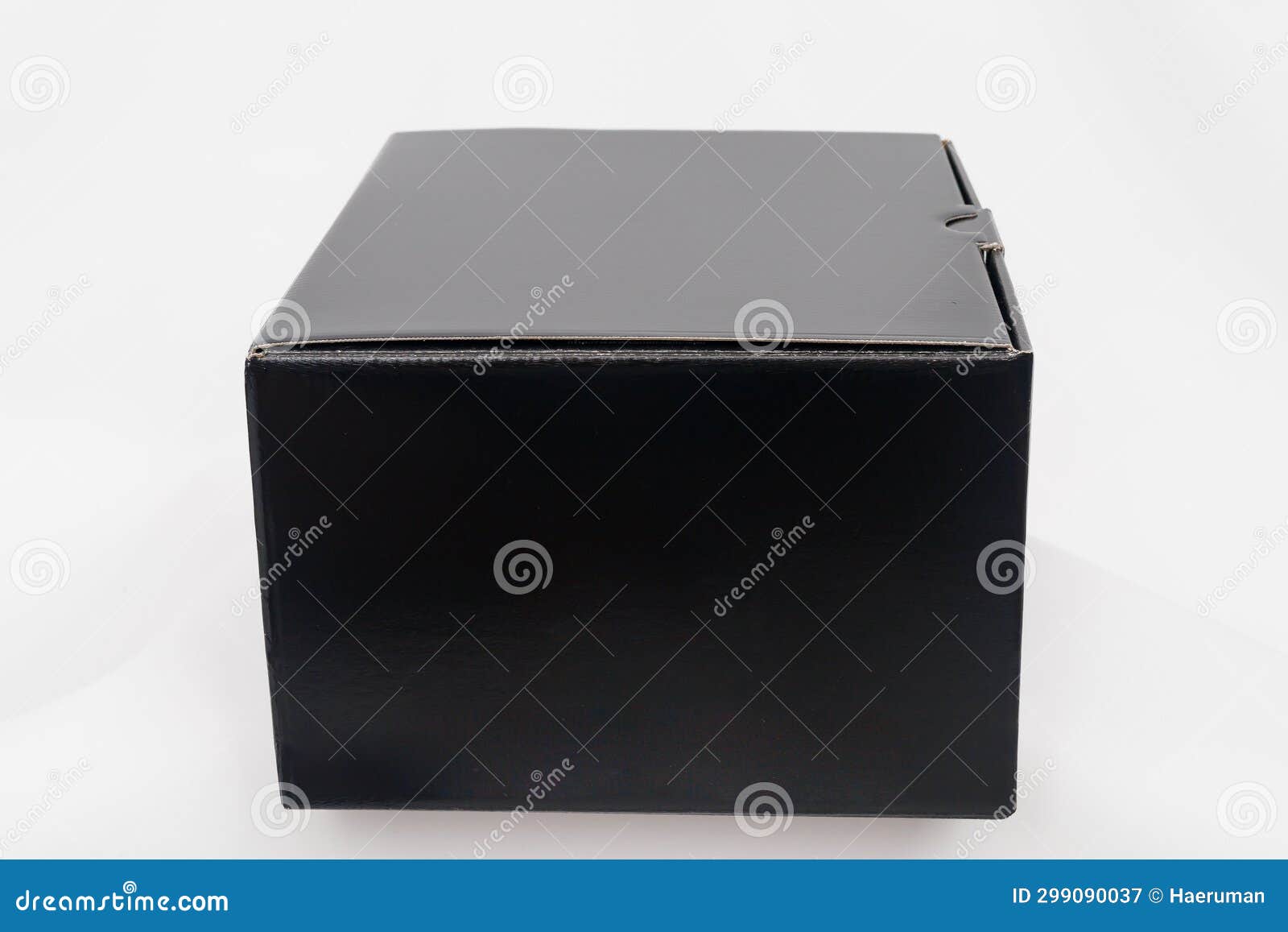 Black Cardboard Box on White Background. Side View Stock Image - Image ...