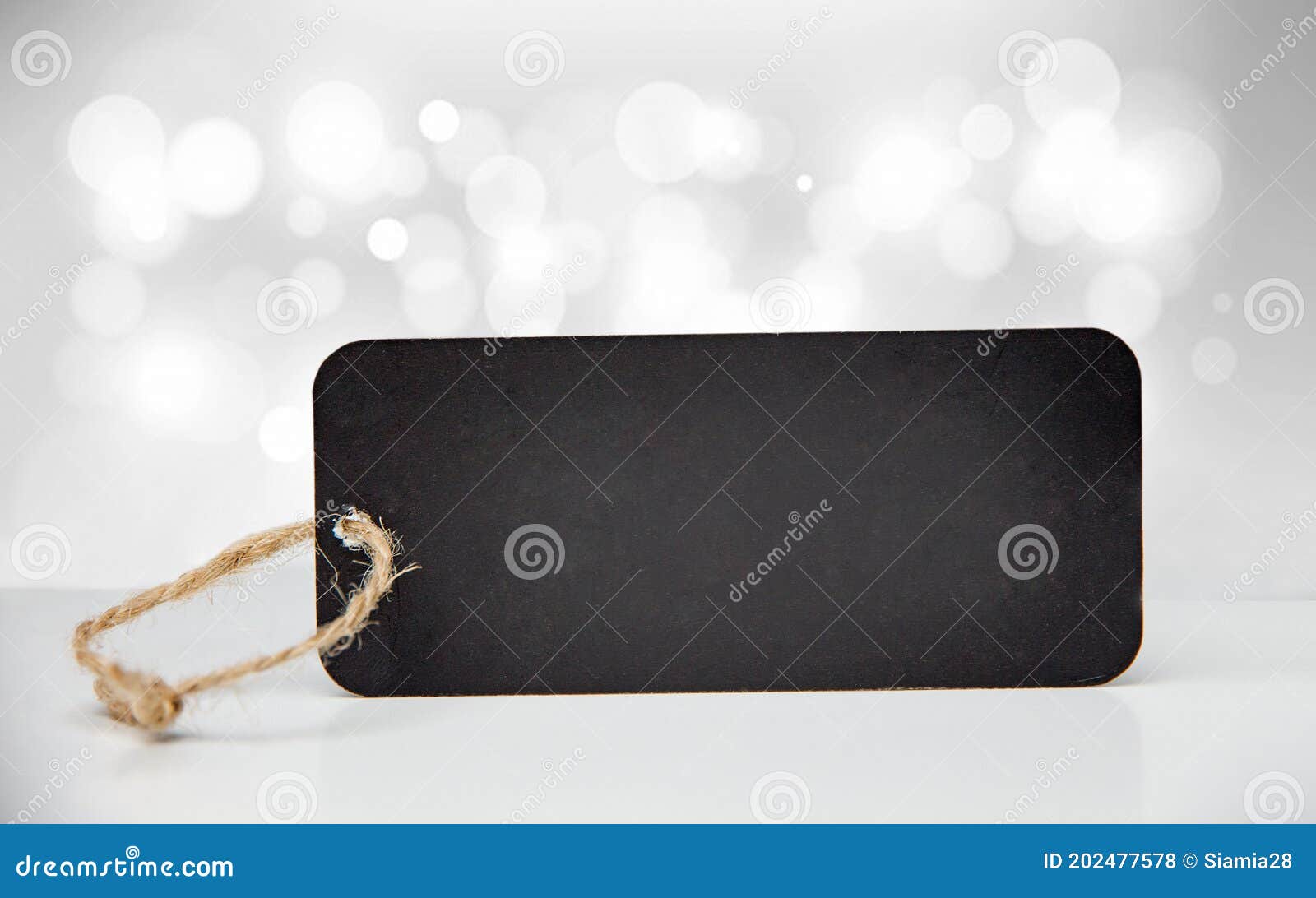 Black Cardboard Label on the Table Stock Photo - Image of message ...