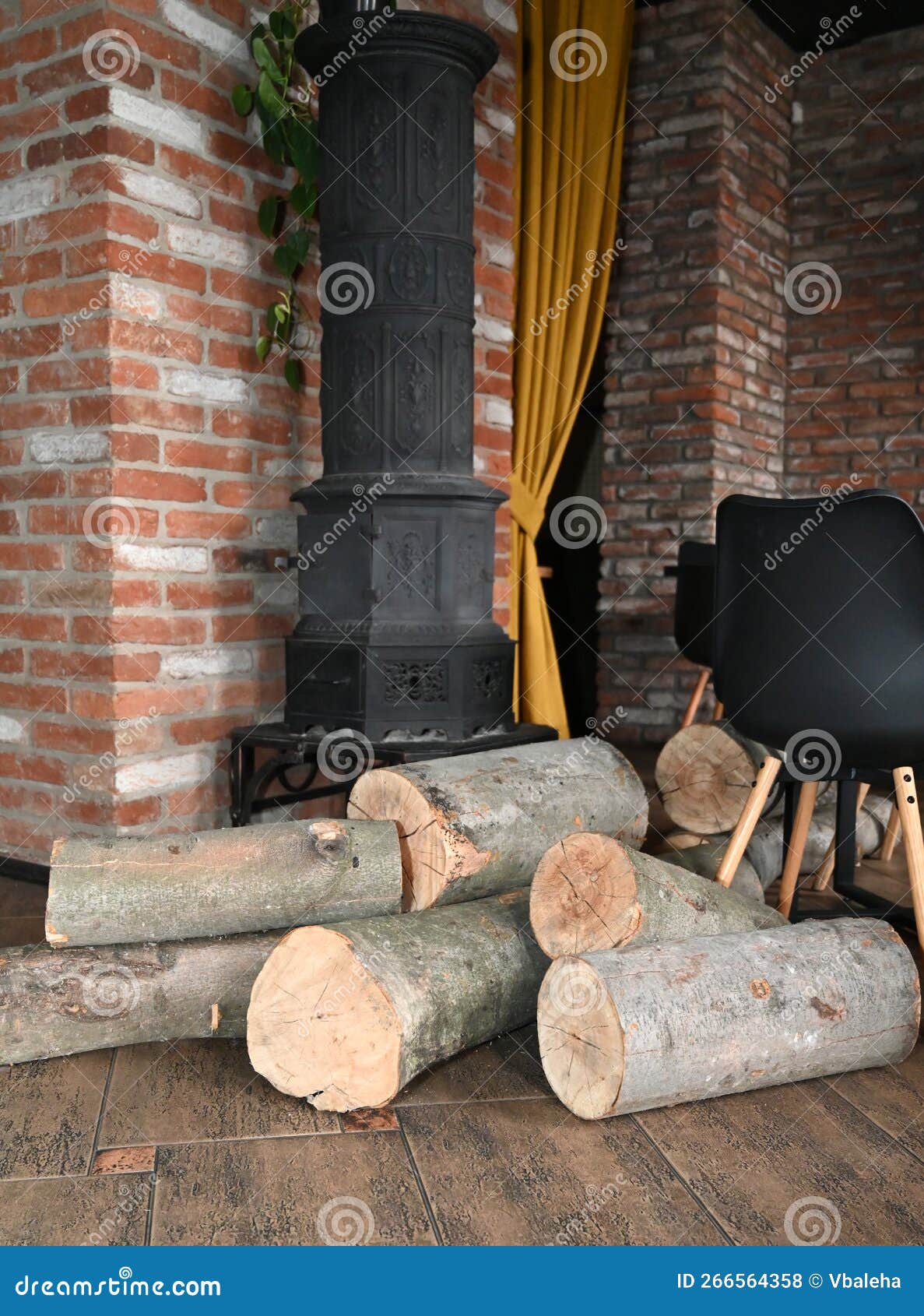 Black Cast Iron Fireplace and Log Wood Stock Photo - Image of inside ...