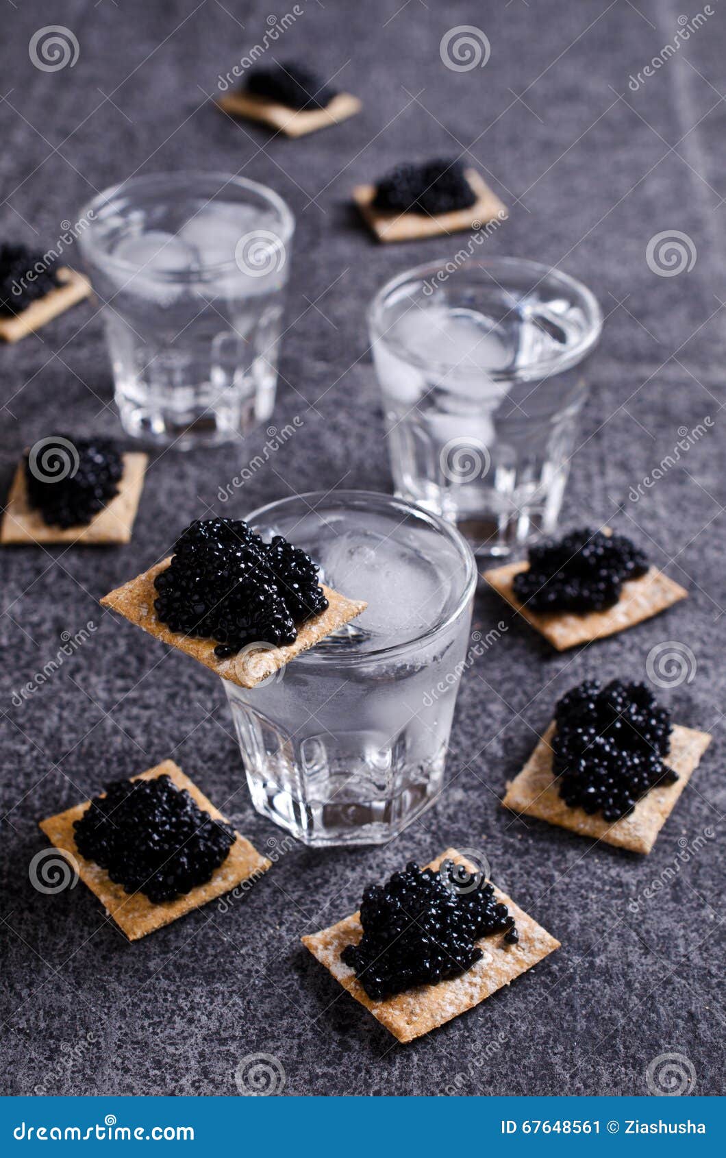Black caviar on a cracker stock image. Image of bead - 67648561