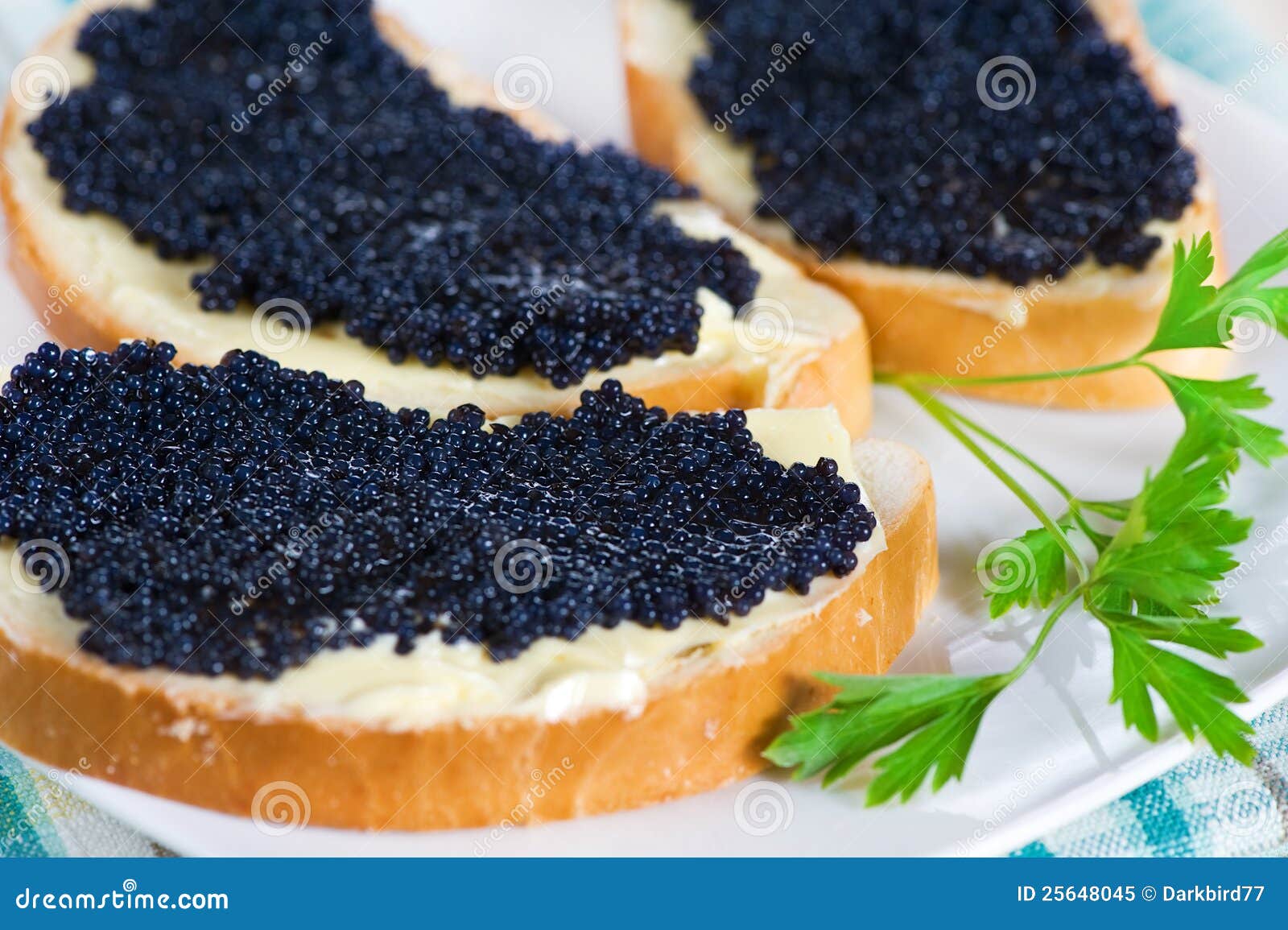 Black Caviar on a Slice of Bread and Butter Stock Image - Image of ...