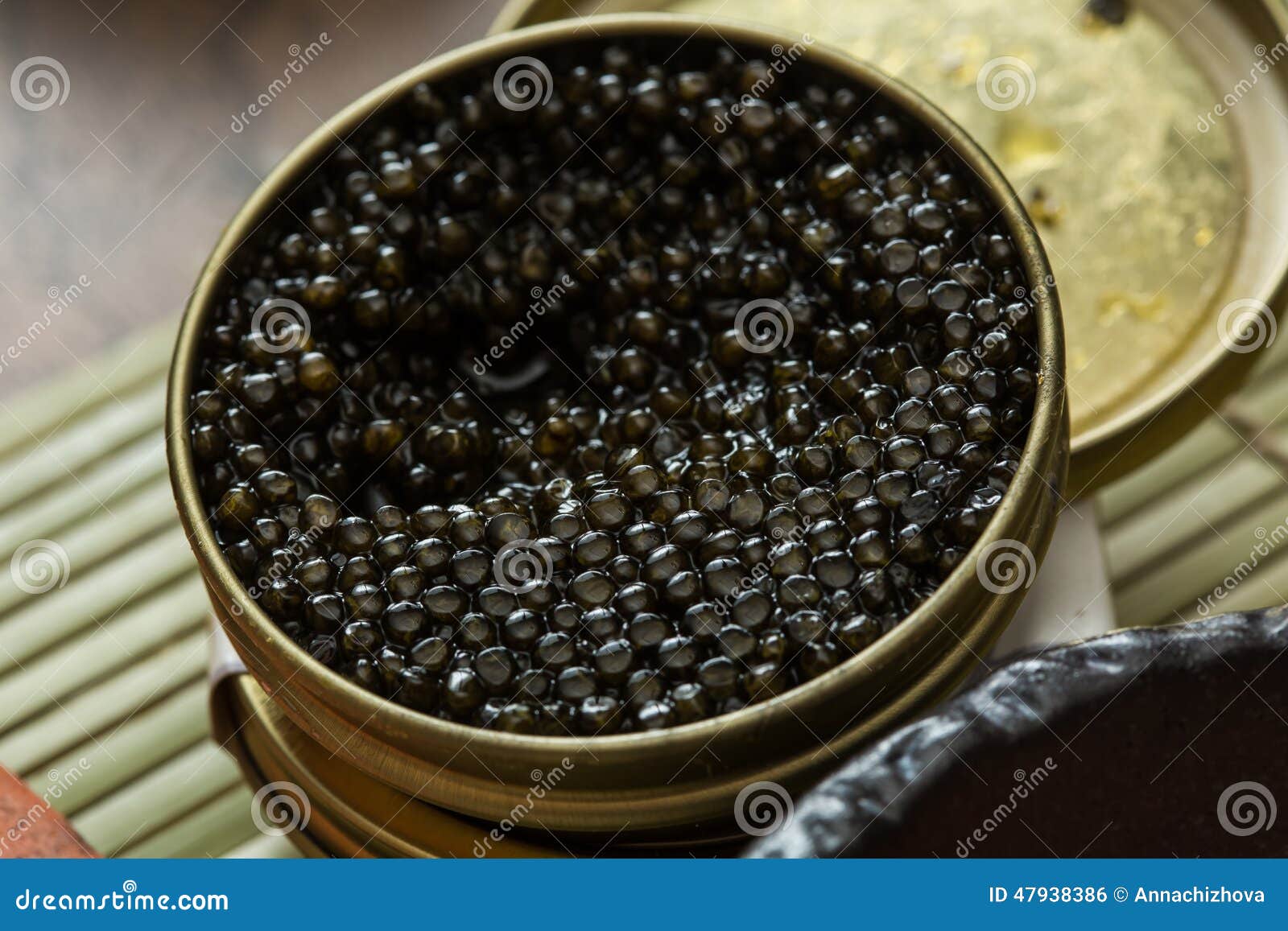 Black Caviar in Small Round Metal Tin Stock Photo - Image of food ...