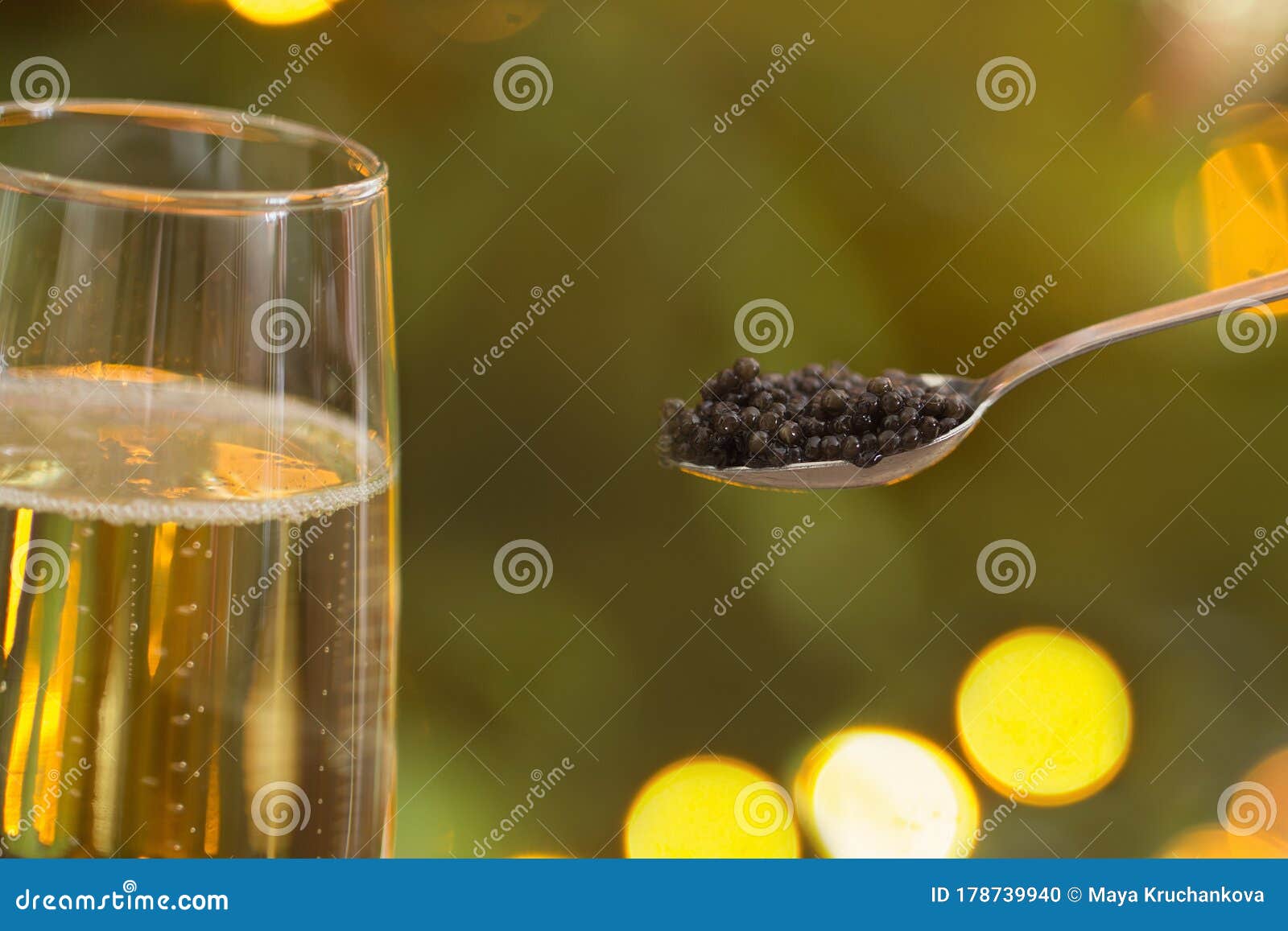 Black Caviar in Spoon and Champagne Stock Photo - Image of glowing ...