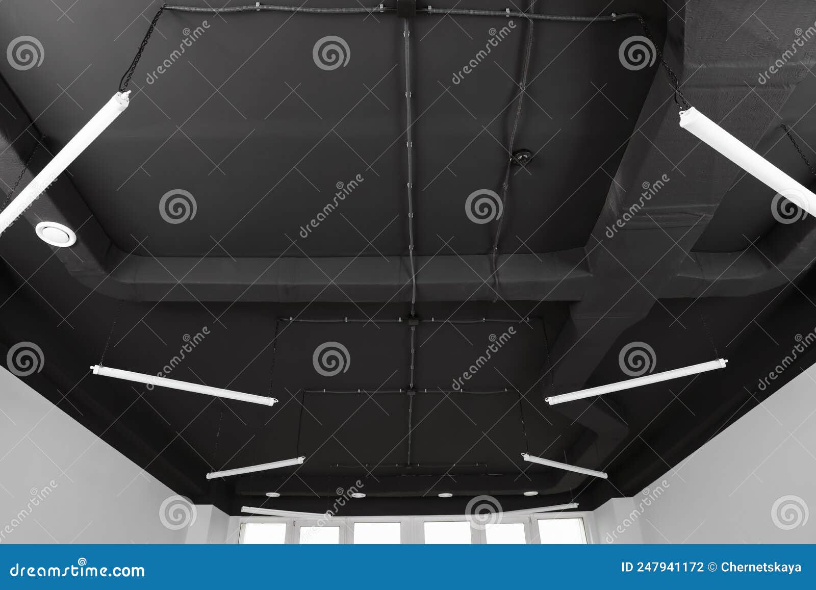 Black Ceiling with Lighting in Office Room Stock Photo - Image of ...