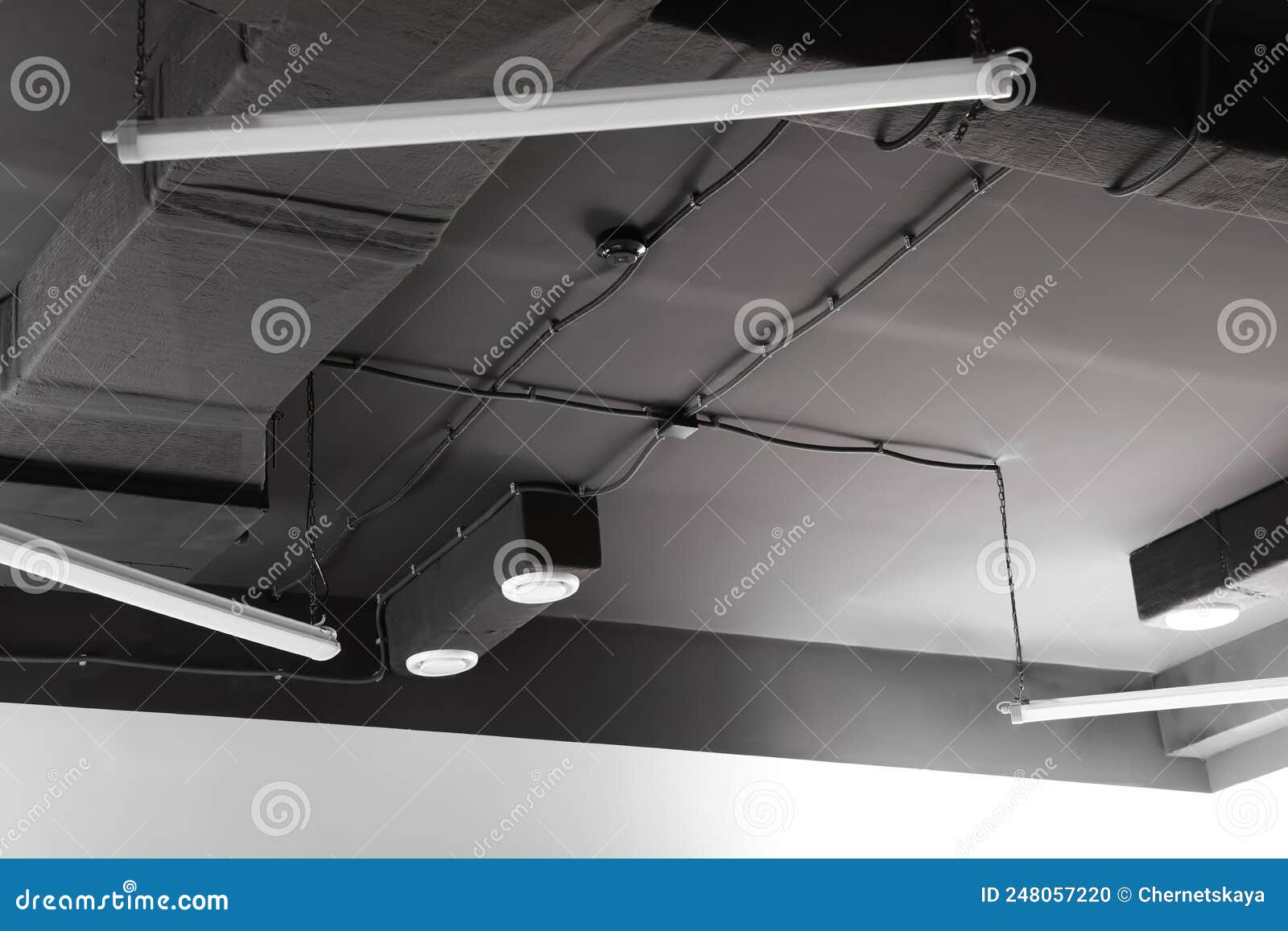 Black Ceiling with Lighting in Office Room Stock Photo - Image of ...