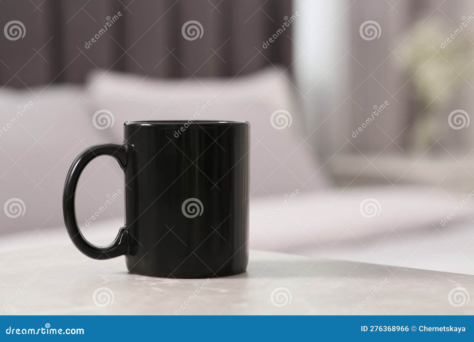 Black Ceramic Mug on Table Indoors. Mockup for Design Stock Photo ...