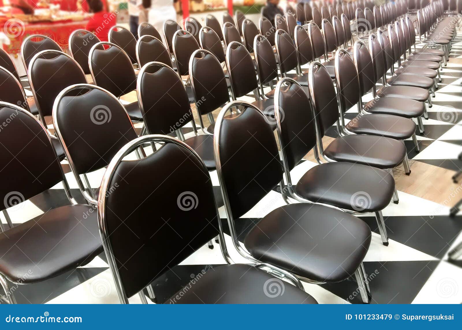 Black Chairs Line Up in Row Stock Image - Image of office, black: 101233479