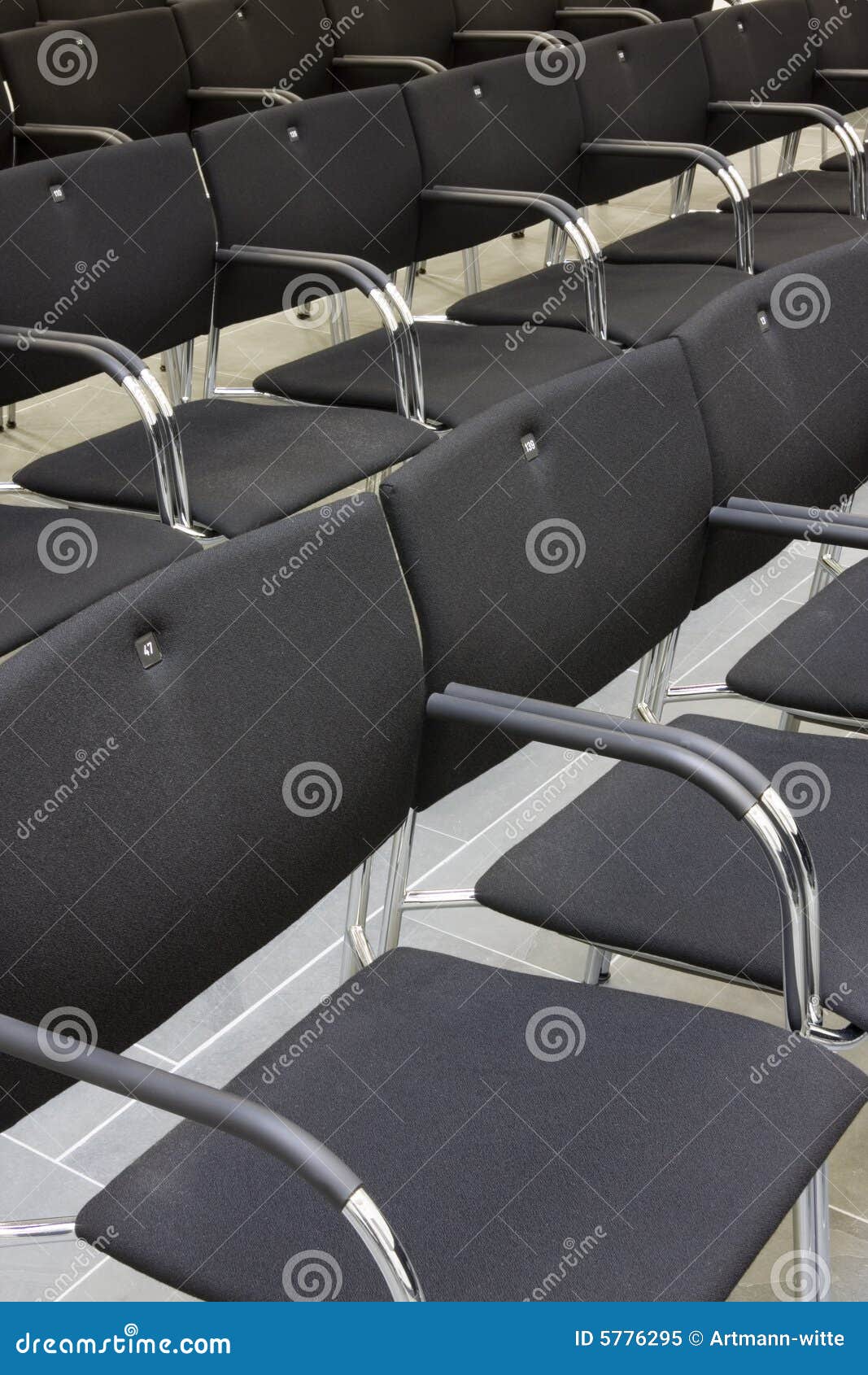 Black chairs in a row stock image. Image of room, chair - 5776295