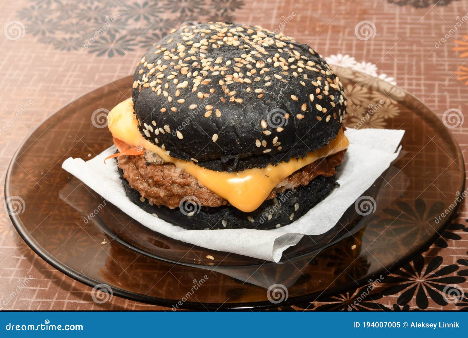 Black Cheeseburger on a Plate Stock Image - Image of close, chopping ...