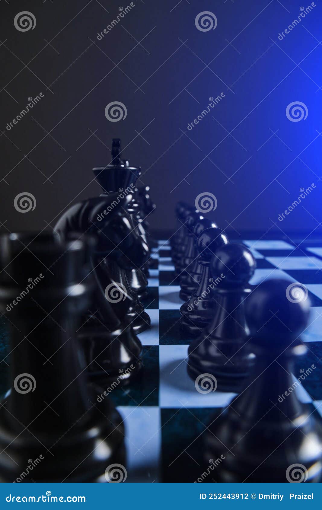 Black Chess Pieces on Chess Board with Bright Blue Background Light ...