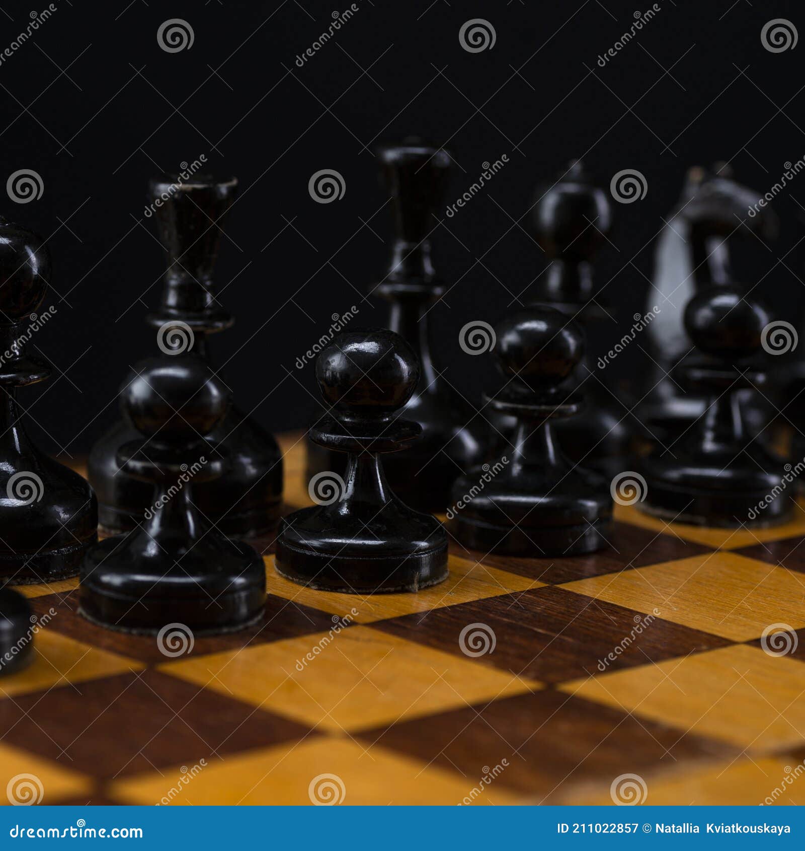 Black Chess Pieces on a Chessboard. an Army of Black Pawns on the Table ...