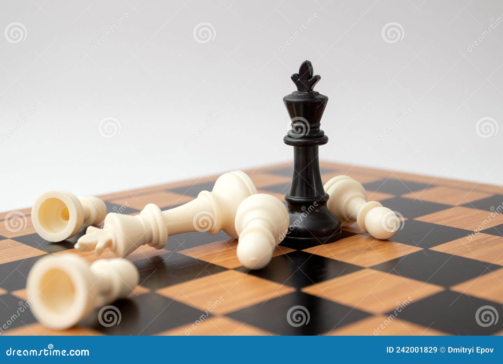 The Black Chess Queen and Fallen White Chess Pieces Stock Image - Image ...