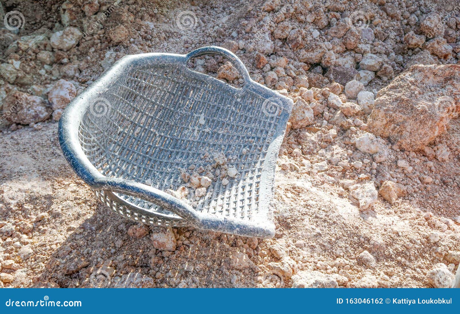 Black Clam-shell Shaped Basket on Soil Pile Stock Photo - Image of dump ...