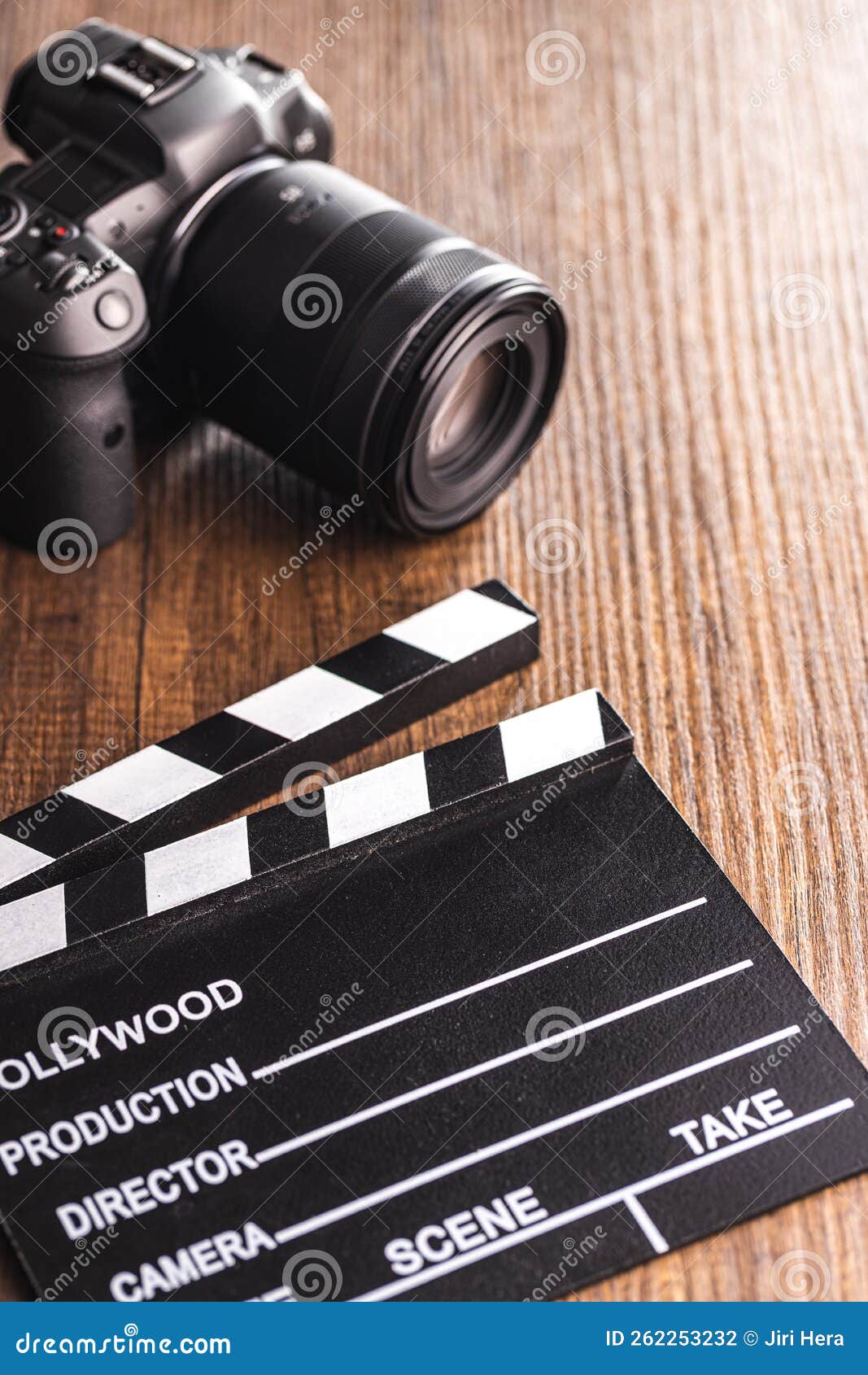 Black Clapper Board and Digital Camera on Wooden Table Stock Photo ...