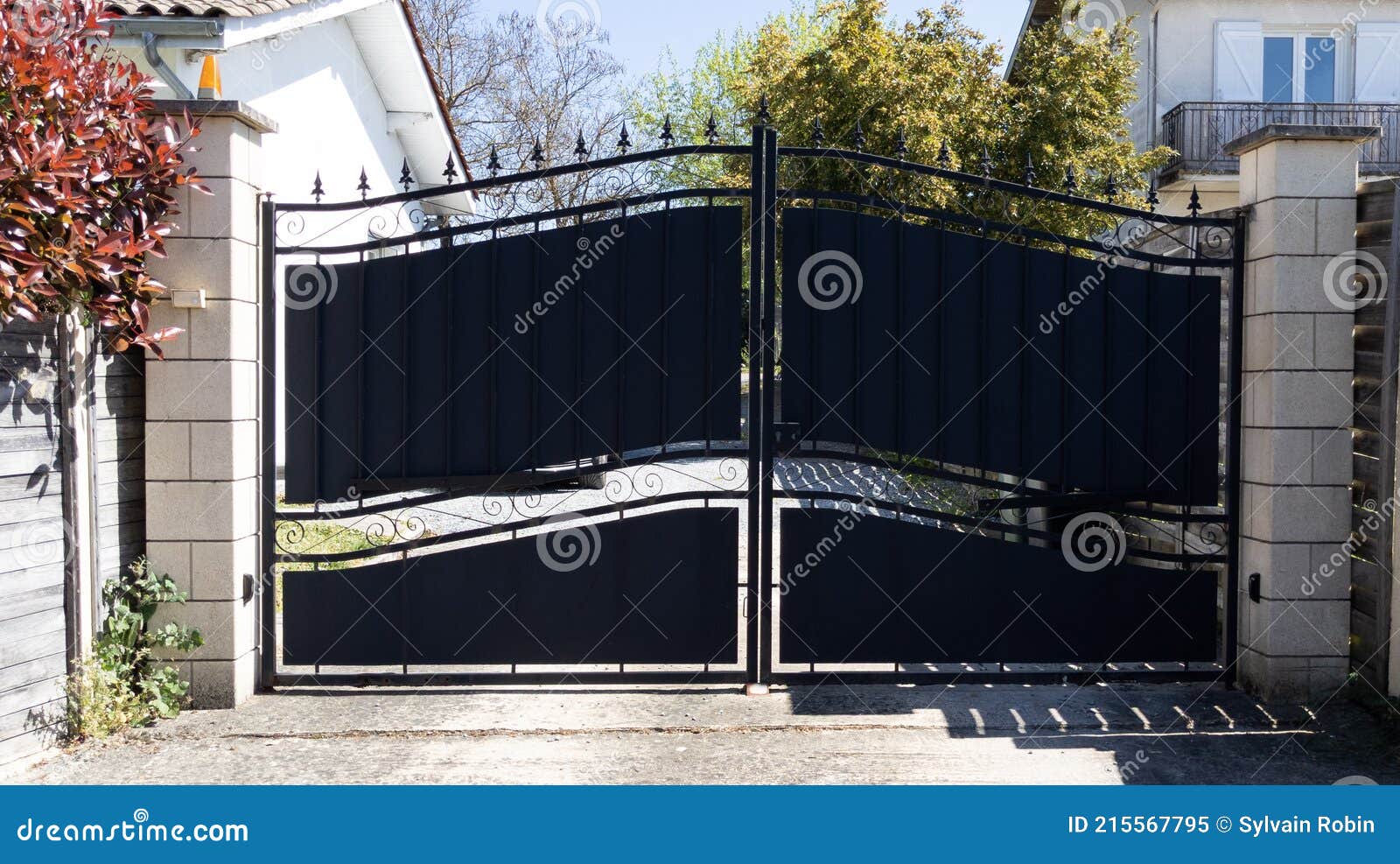 Black Classical Gate of Classic Detached House in Suburb Street Stock ...