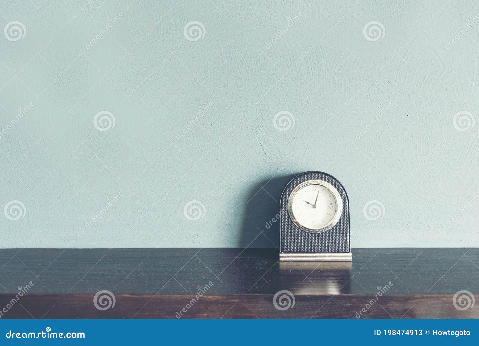 Black Clock at Blue Wall Time Management Stock Image - Image of ...