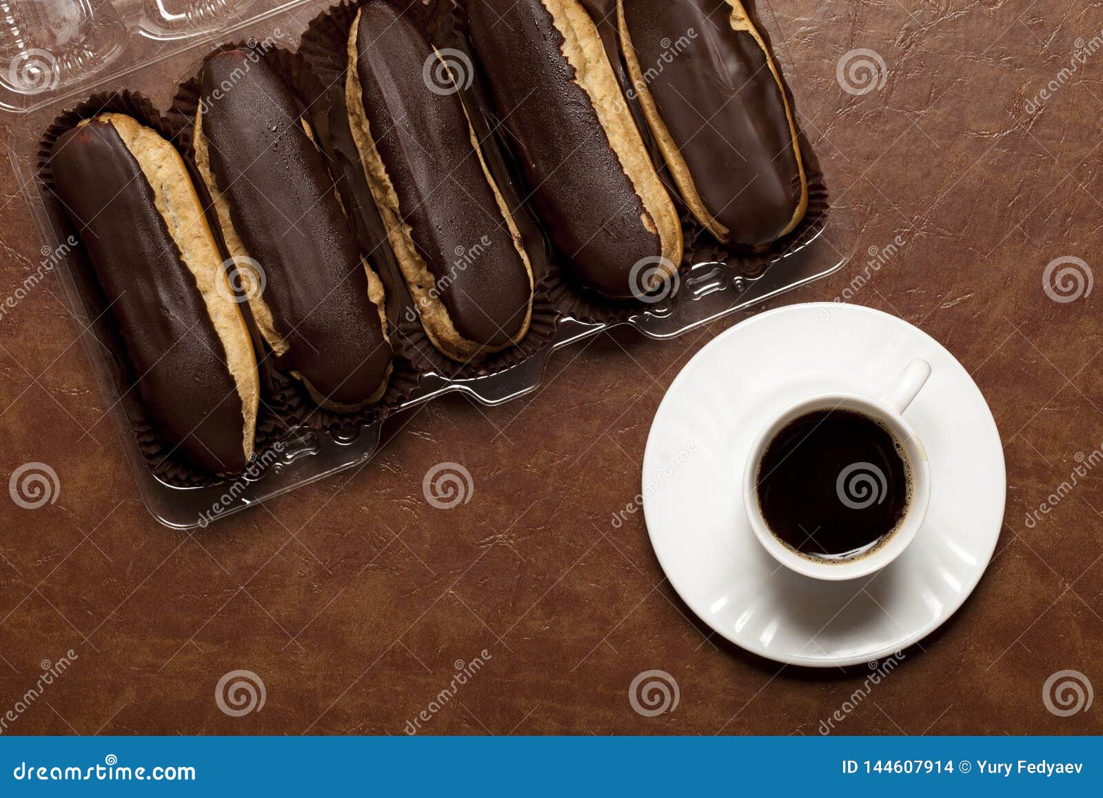 Black Coffee, Chocolate Eclair, Coffee in a White Cup, White Saucer, on ...