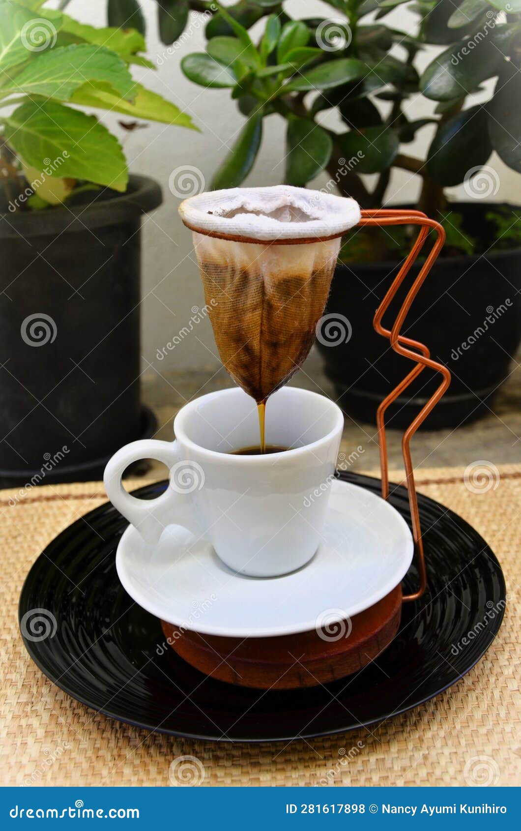 Straining Fresh Coffee into Small Cup Stock Photo - Image of liquid ...