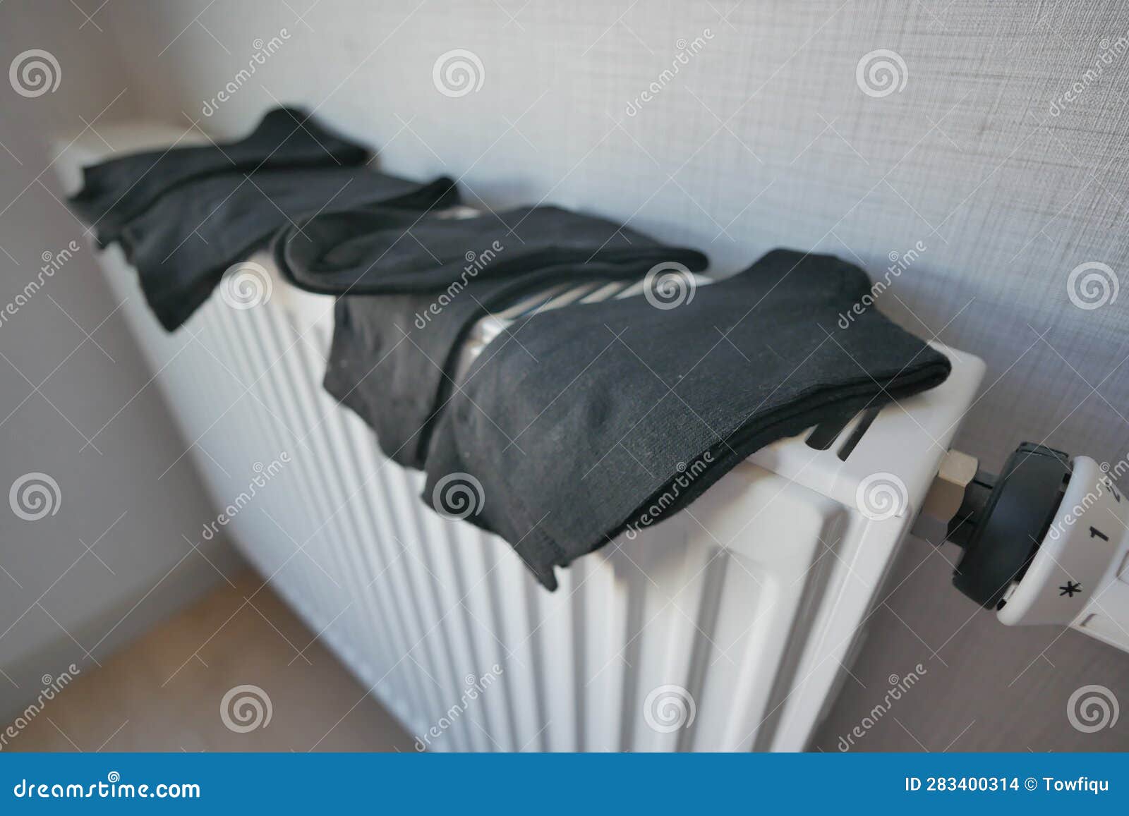 Black Color Sock Drying on Heating Radiator, Stock Photo - Image of ...