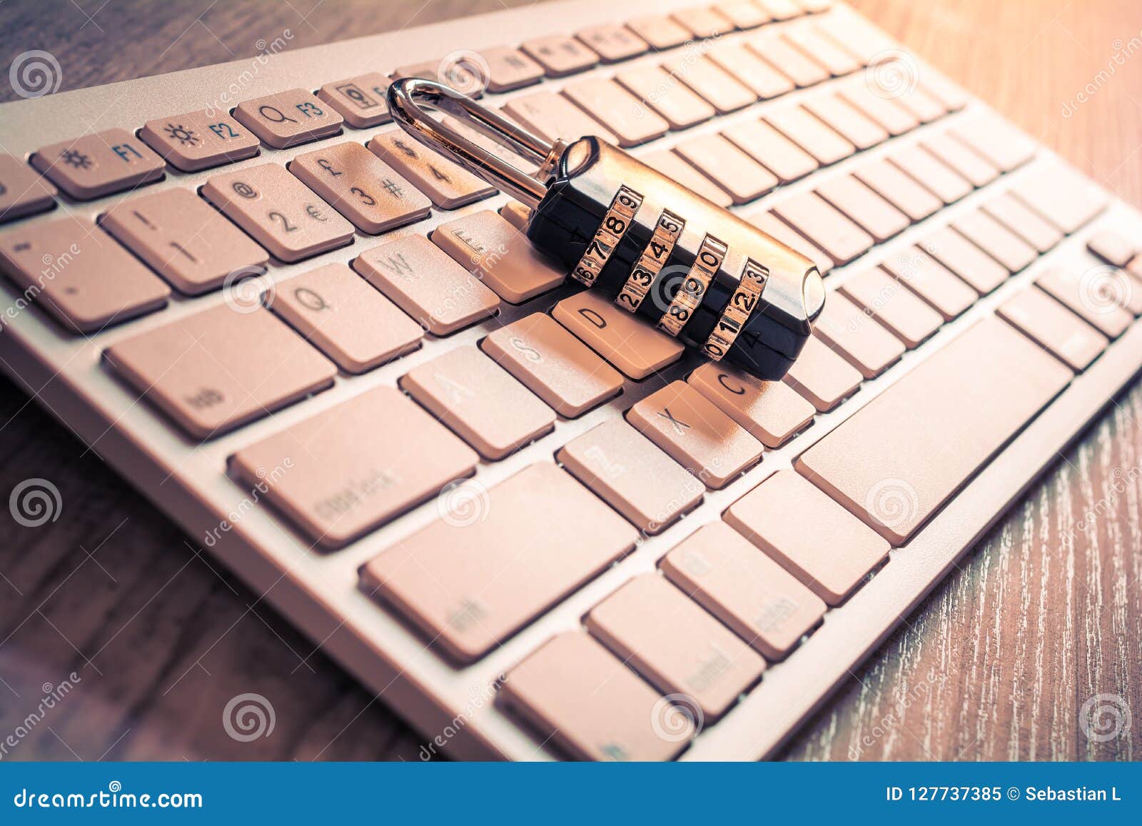 Black Combination Lock on a White Keyboard - Secure Computer Login ...