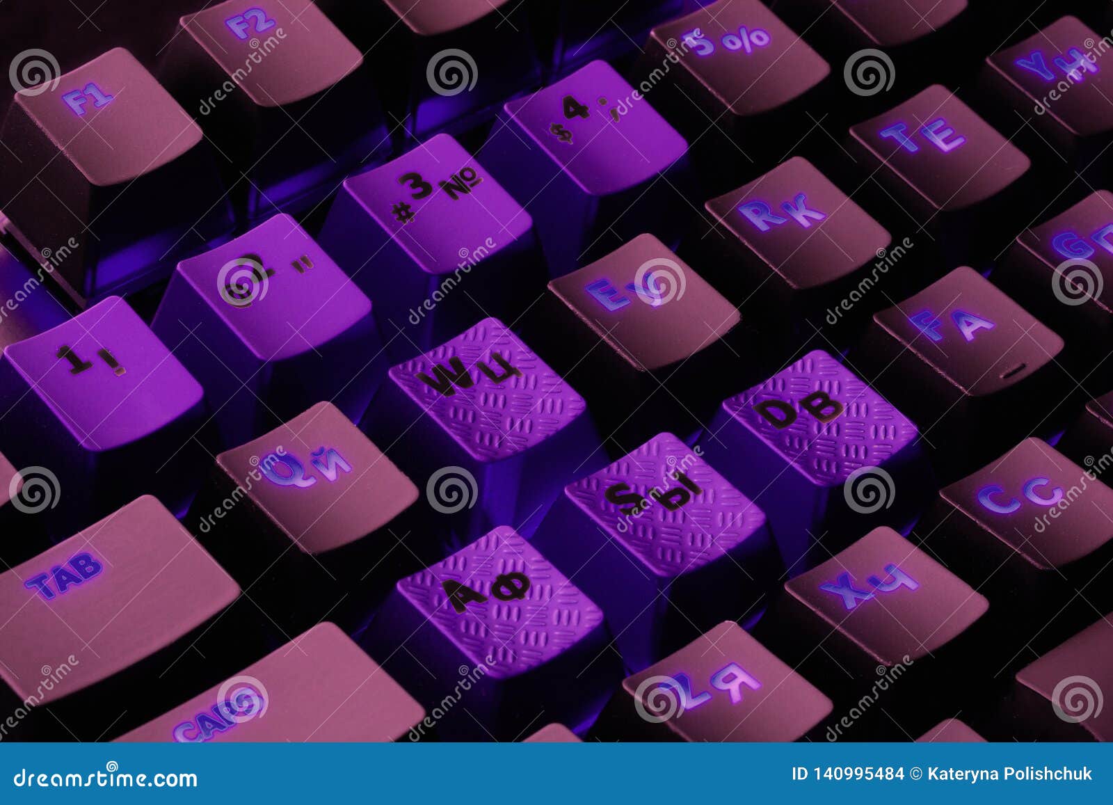 Black Computer Keyboard with Purple Keys, Latin and Cyrillics Stock ...