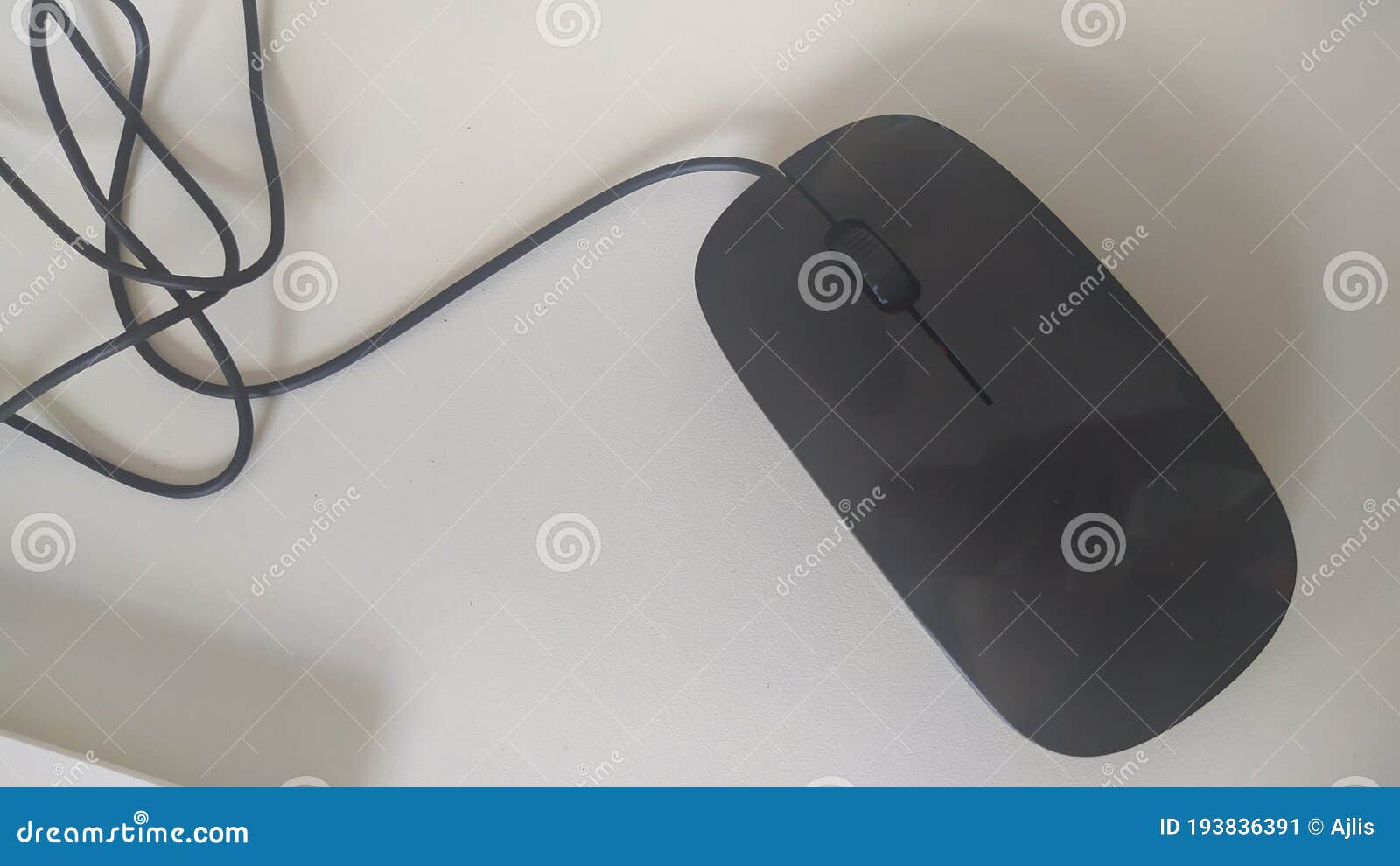 Black Computer Mouse with a Wire on White Background Stock Image ...