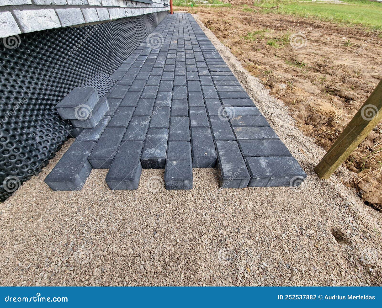 Black Concrete Brick Pavement during Laying Process Stock Photo - Image ...