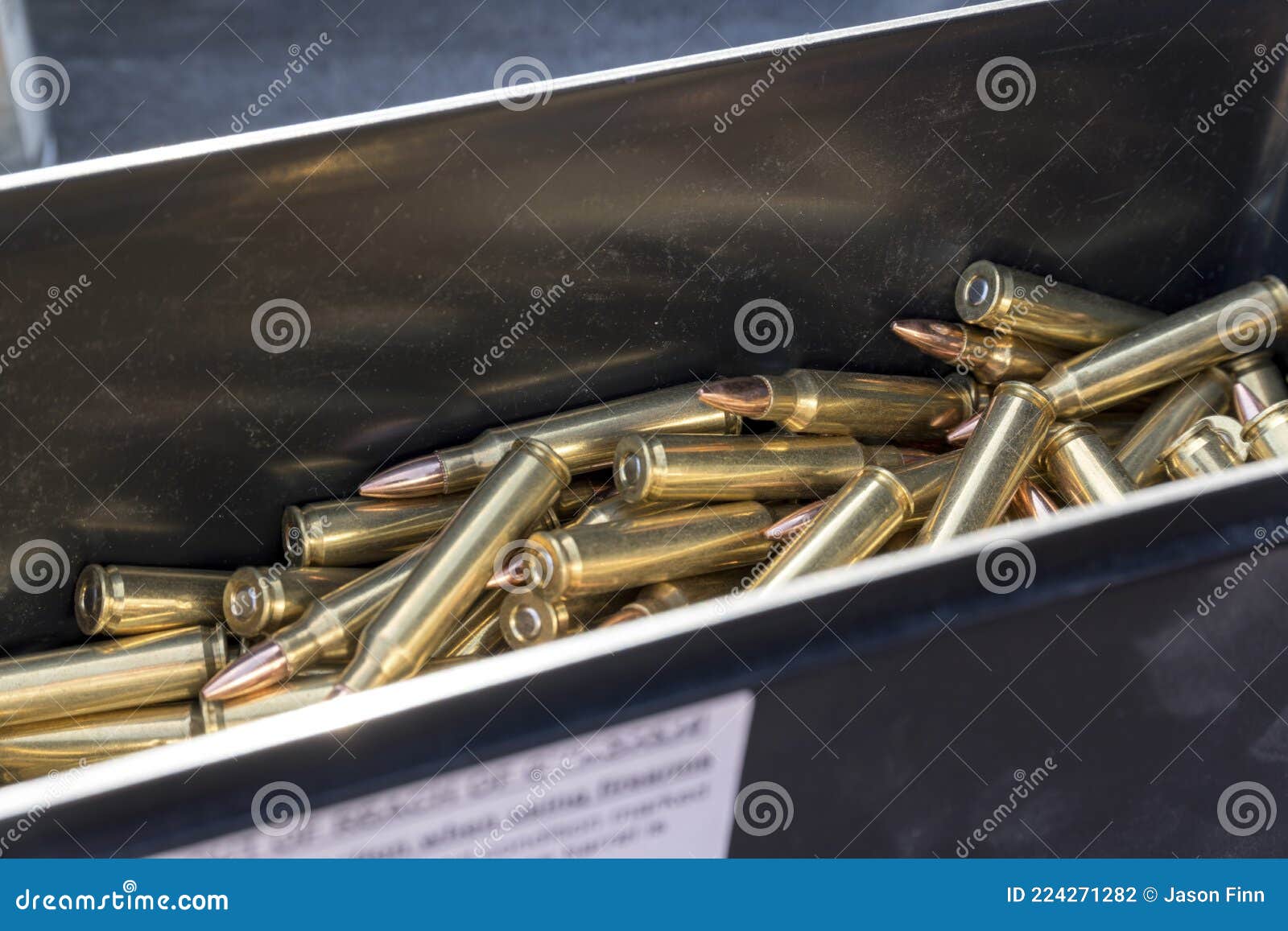 Black Container Box with a Pile of Copper Bullets Inside Stock Photo ...