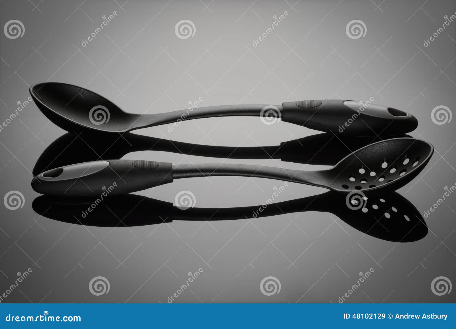 Black Cooking Spoons stock image. Image of textured, cook - 48102129
